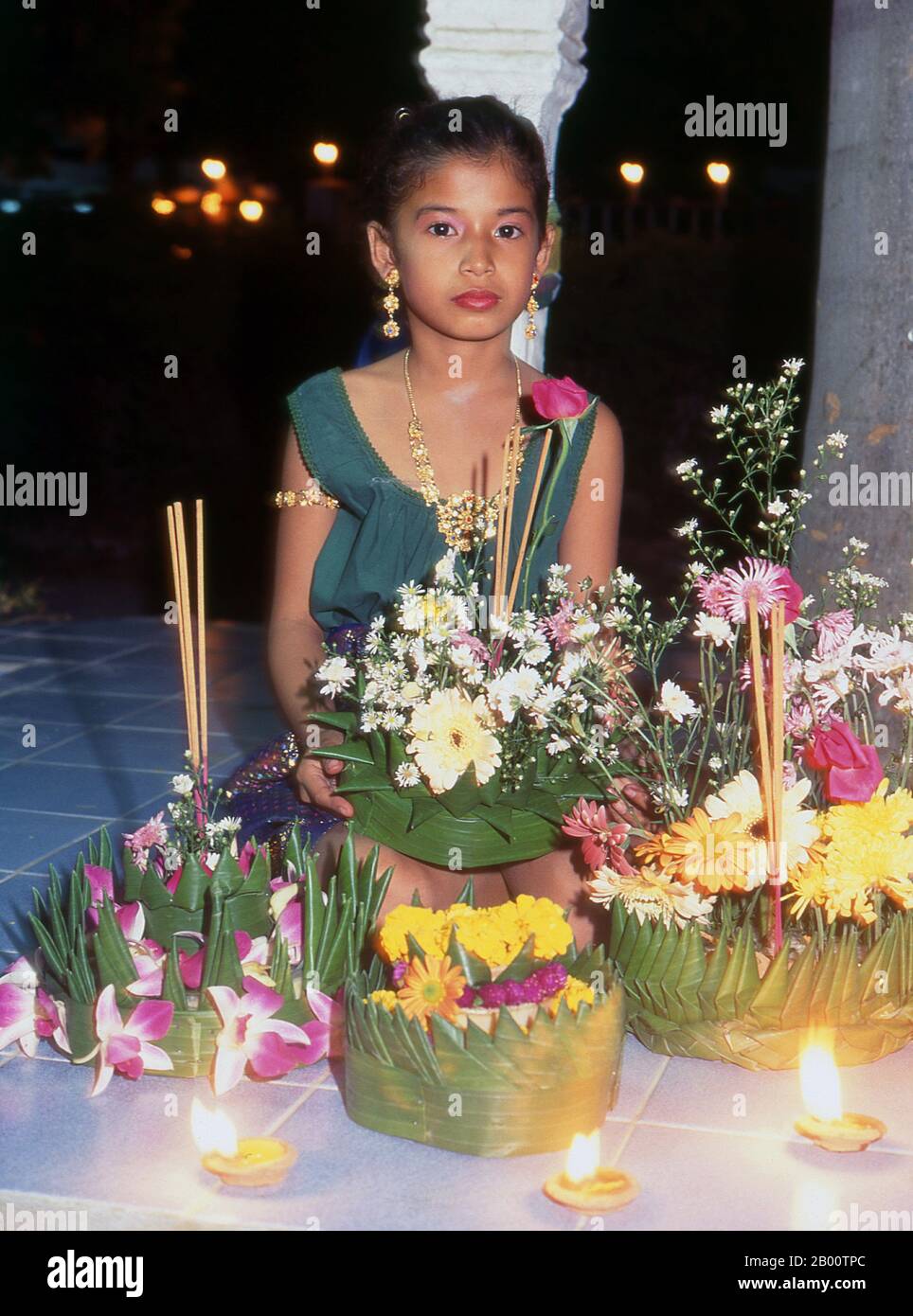 Thailand: Girl in traditional clothing with krathongs, Loy Krathong ...
