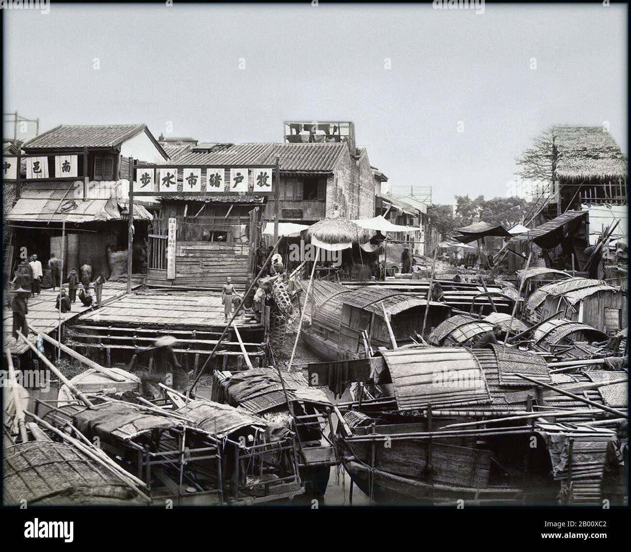 China: Sampans moored at Canton (Guangzhou) c. 1880-1890. A sampan ...