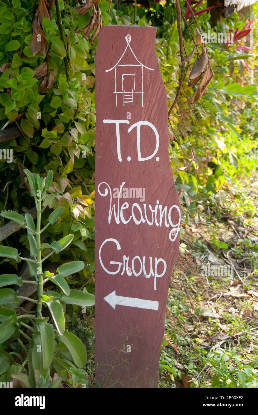 Thailand: A sign for the Tai Dam weaving group of the 12th District ...