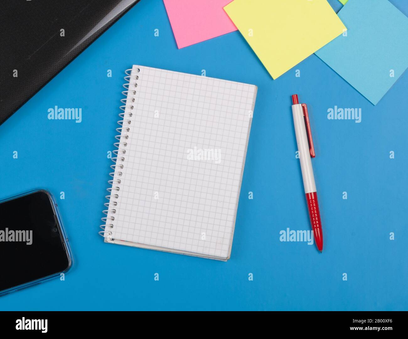 notebook for notes on a desk top view Stock Photo - Alamy