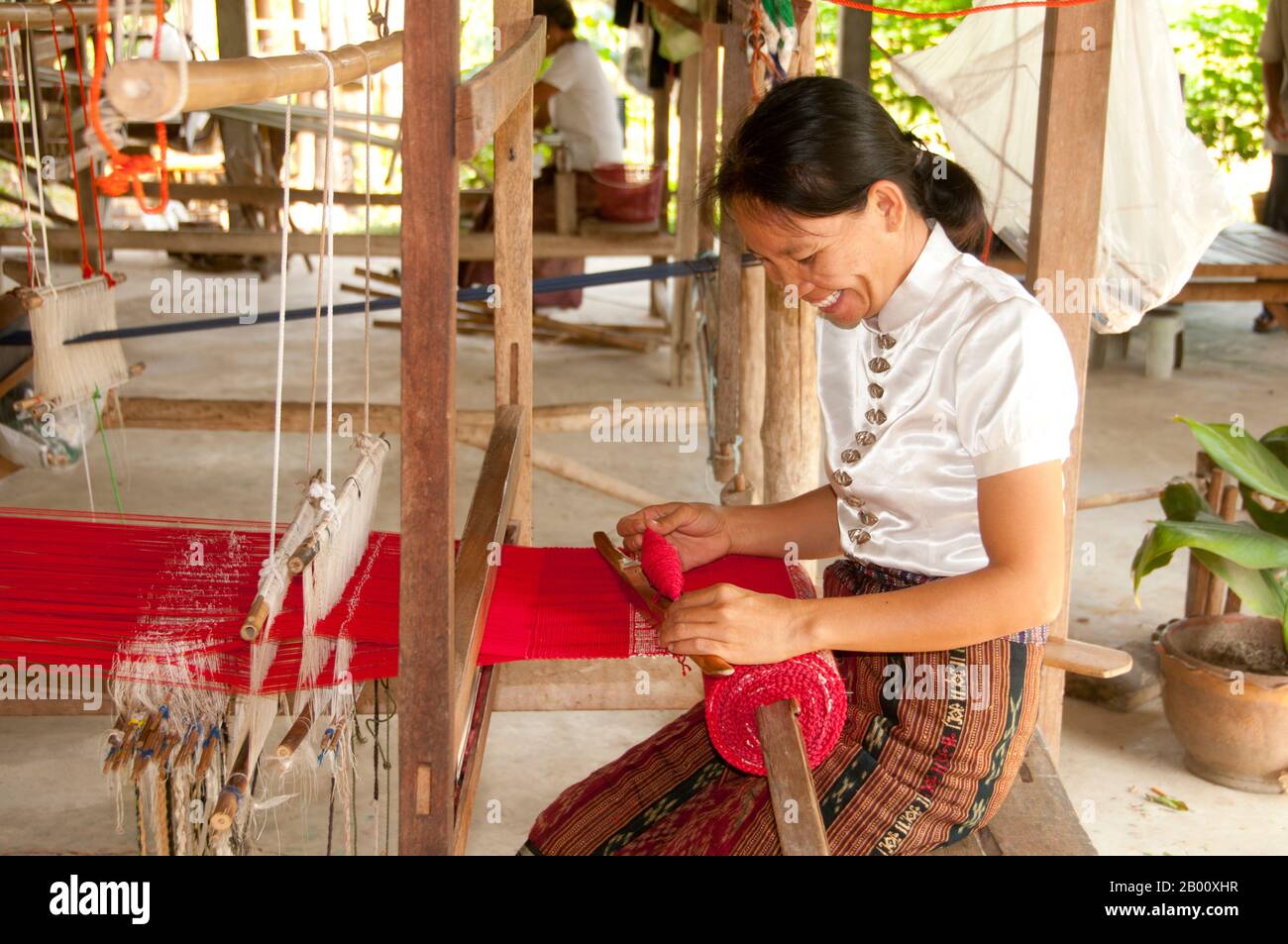 Thailand: A weaver of the 12th District Tai Dam Weaving Group, Ban Na ...