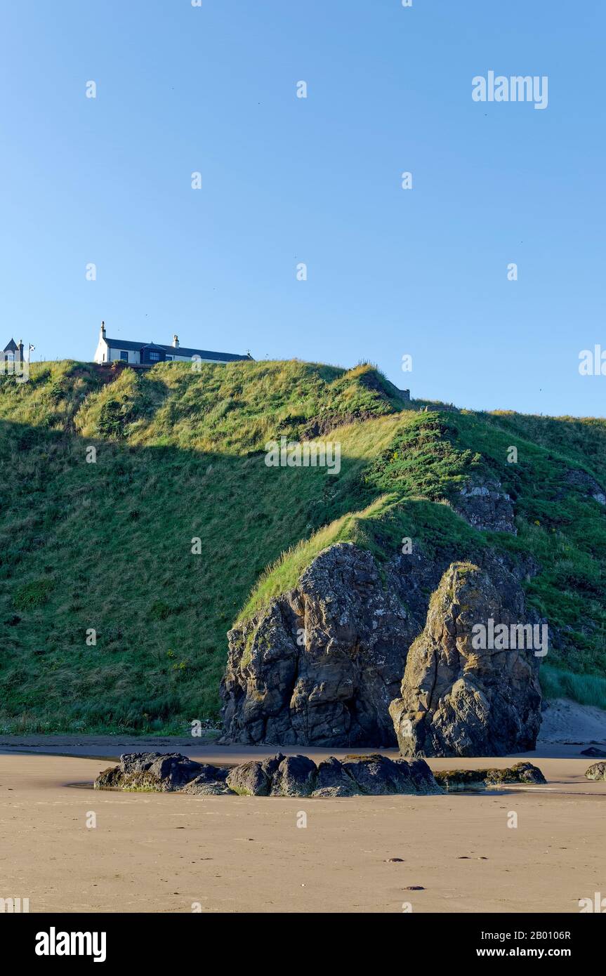 Traditional Fishing Houses on the Edge of the Grass covered Cliffs at ...