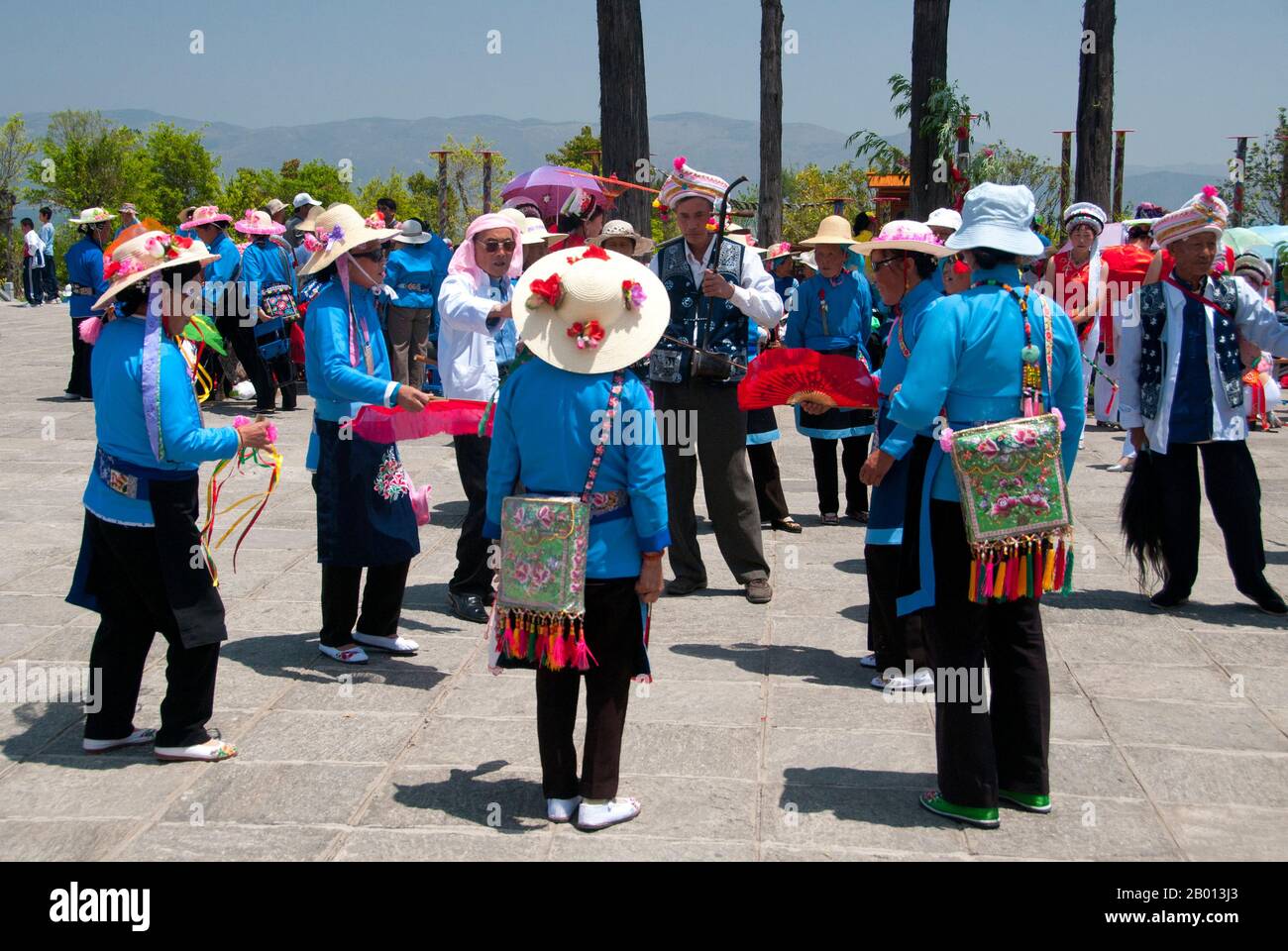 China: Bai women dancing at the Bai music and dance festival at Santa ...