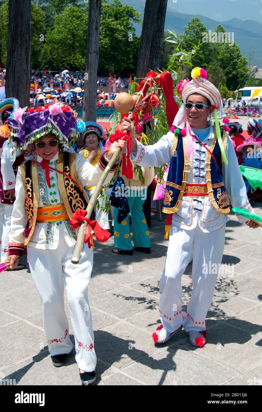 China: A Bai couple dance at the Bai music and dance festival at Santa ...