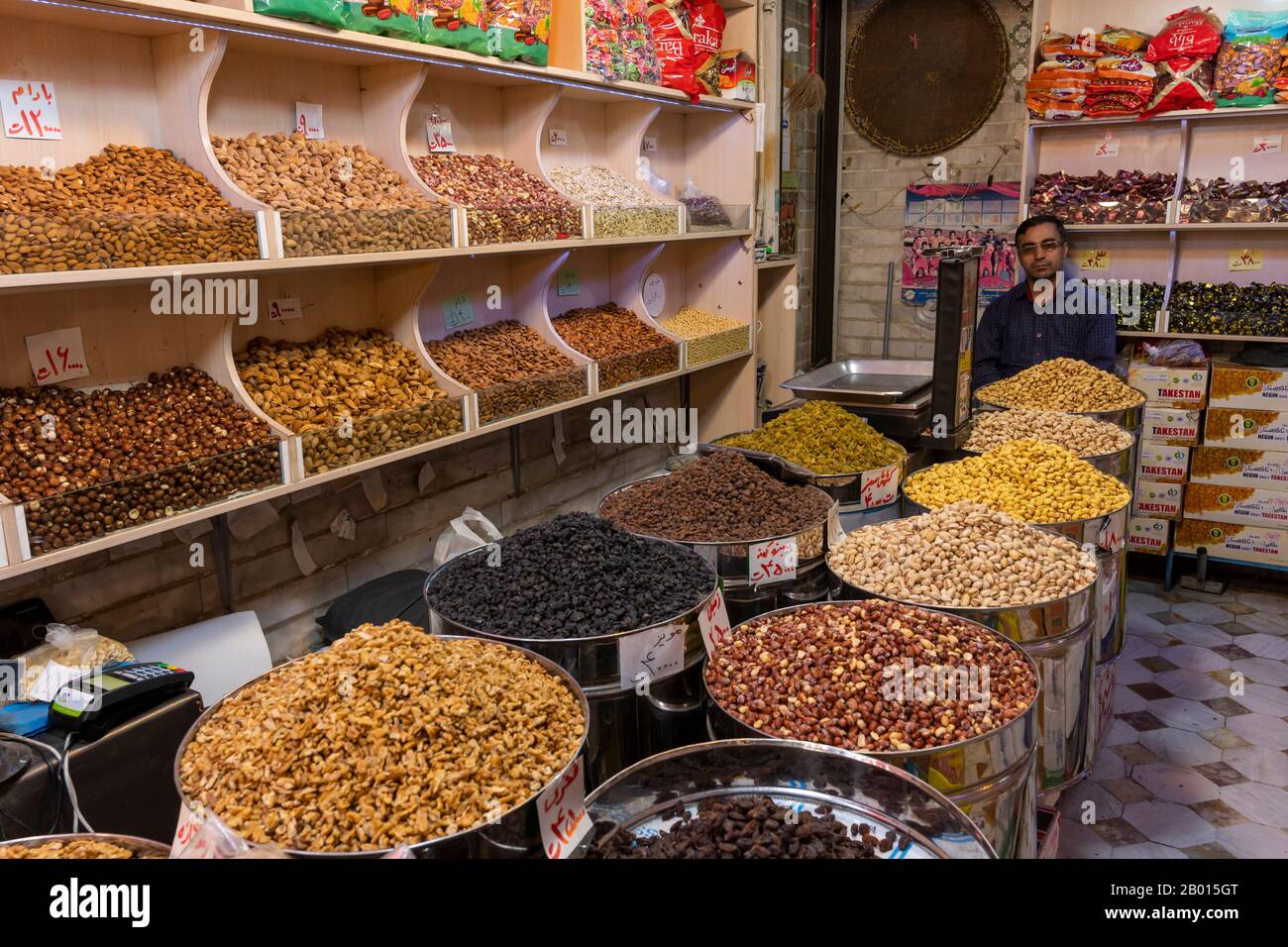 Tabriz, Iran - May 12, 2019: Great Bazaar in Tabriz with man in a nuts ...