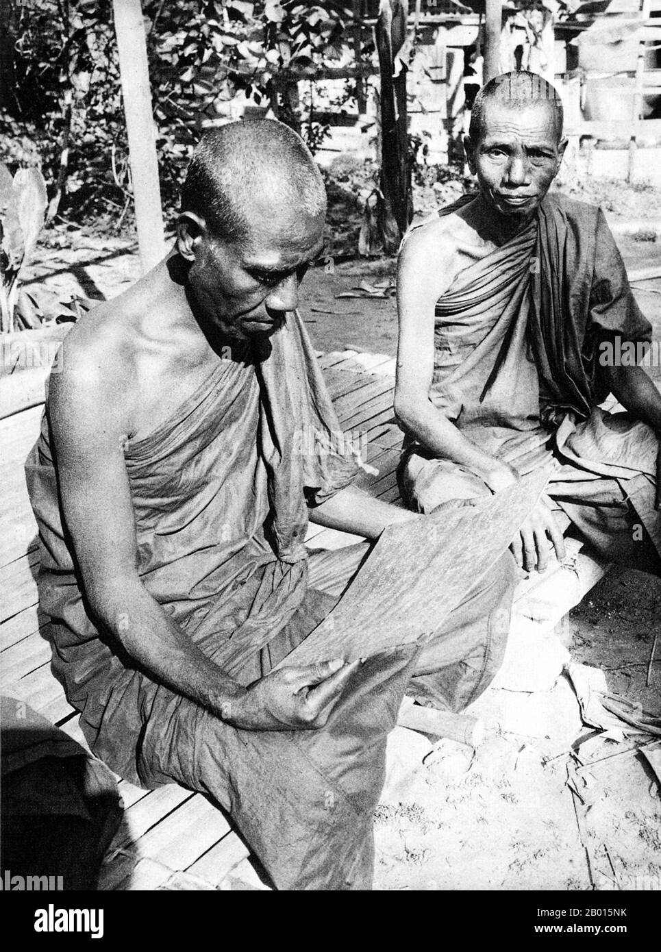 Burma/Myanmar: A Buddhist monk in Burma reads a palm-leaf book, c ...