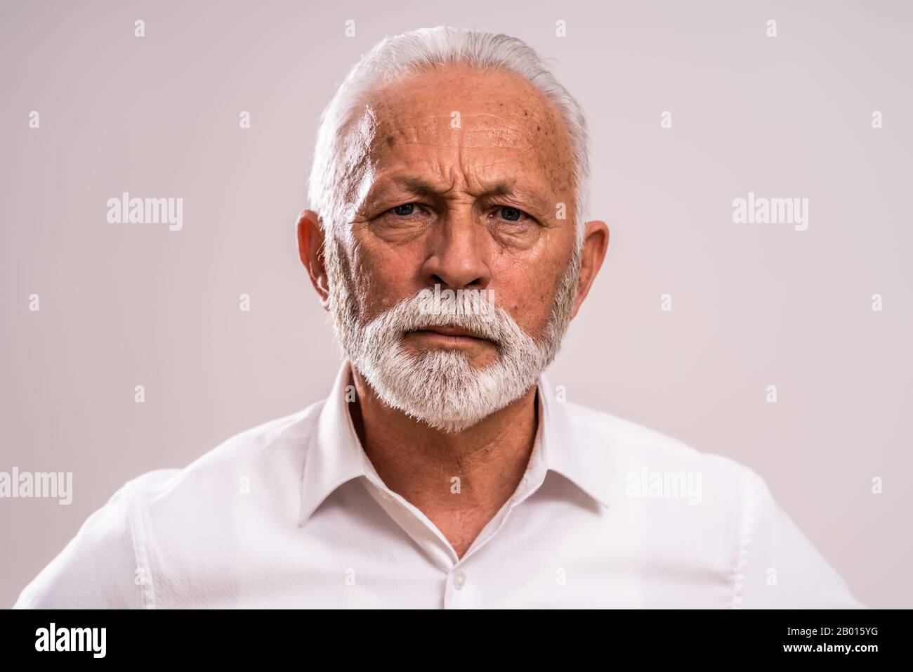 Portrait of serious and authoritative senior man Stock Photo - Alamy