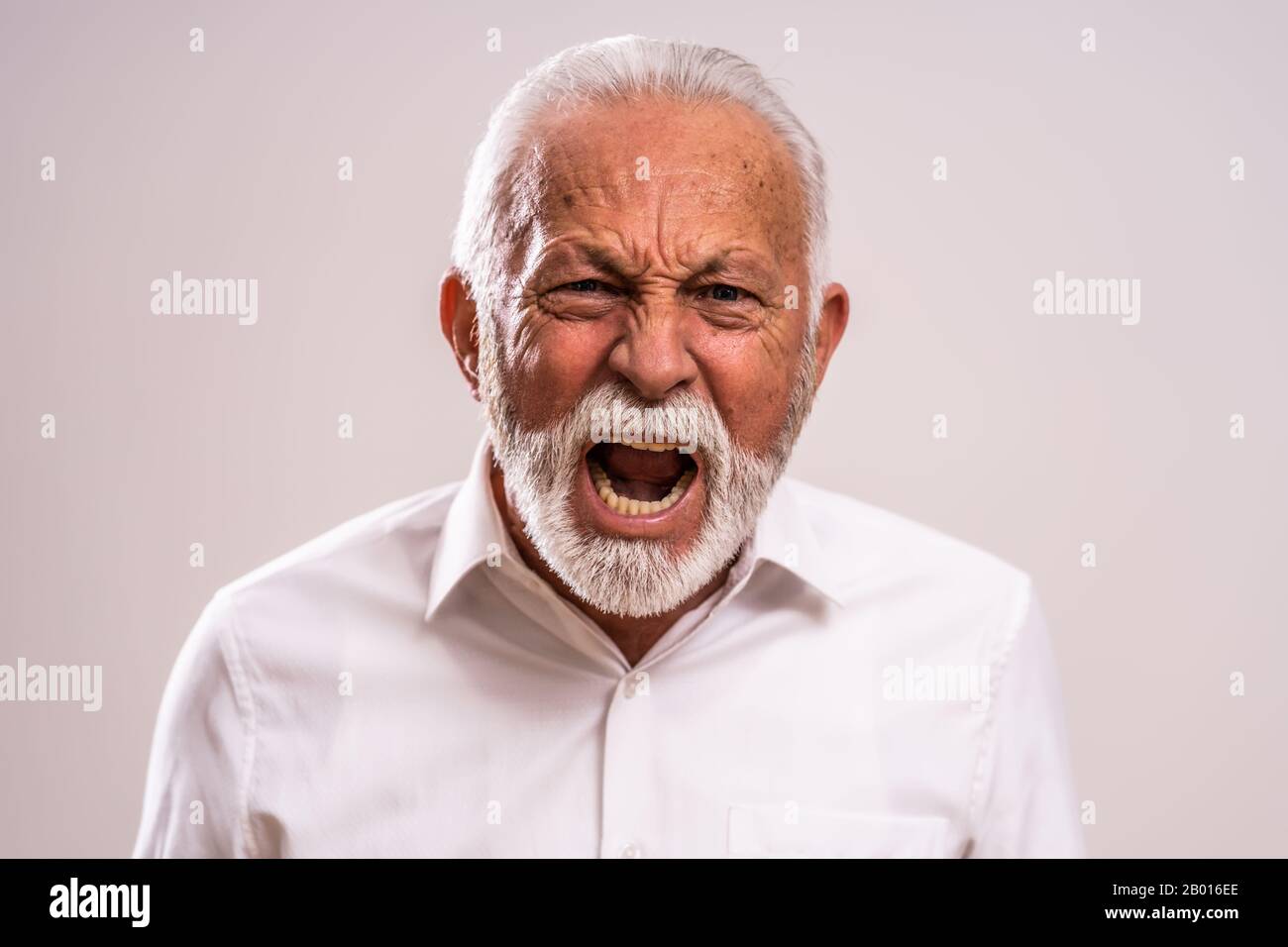 Portrait of furious senior man who is screaming Stock Photo - Alamy