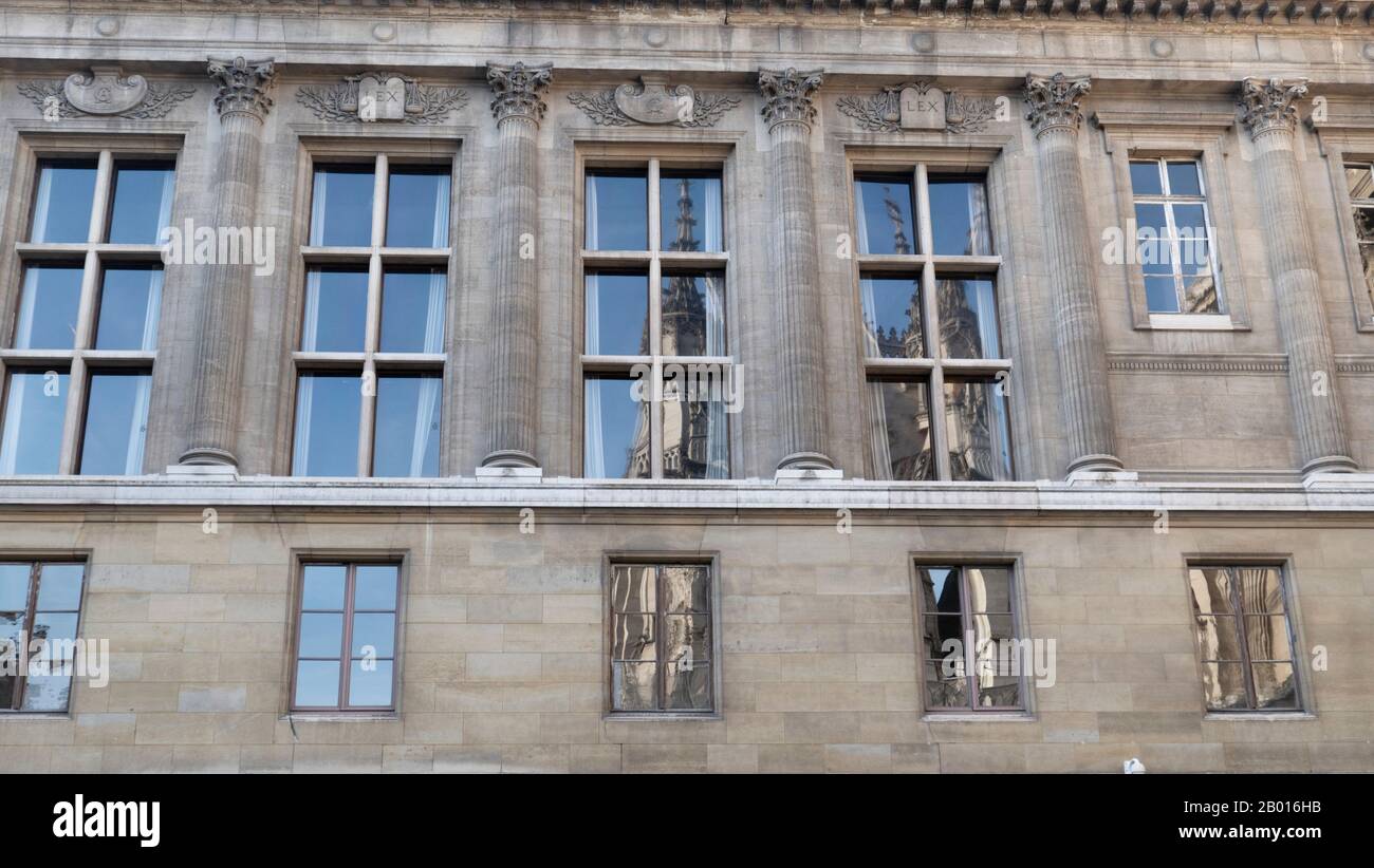 Reflections of buildings seen in windows Stock Photo - Alamy