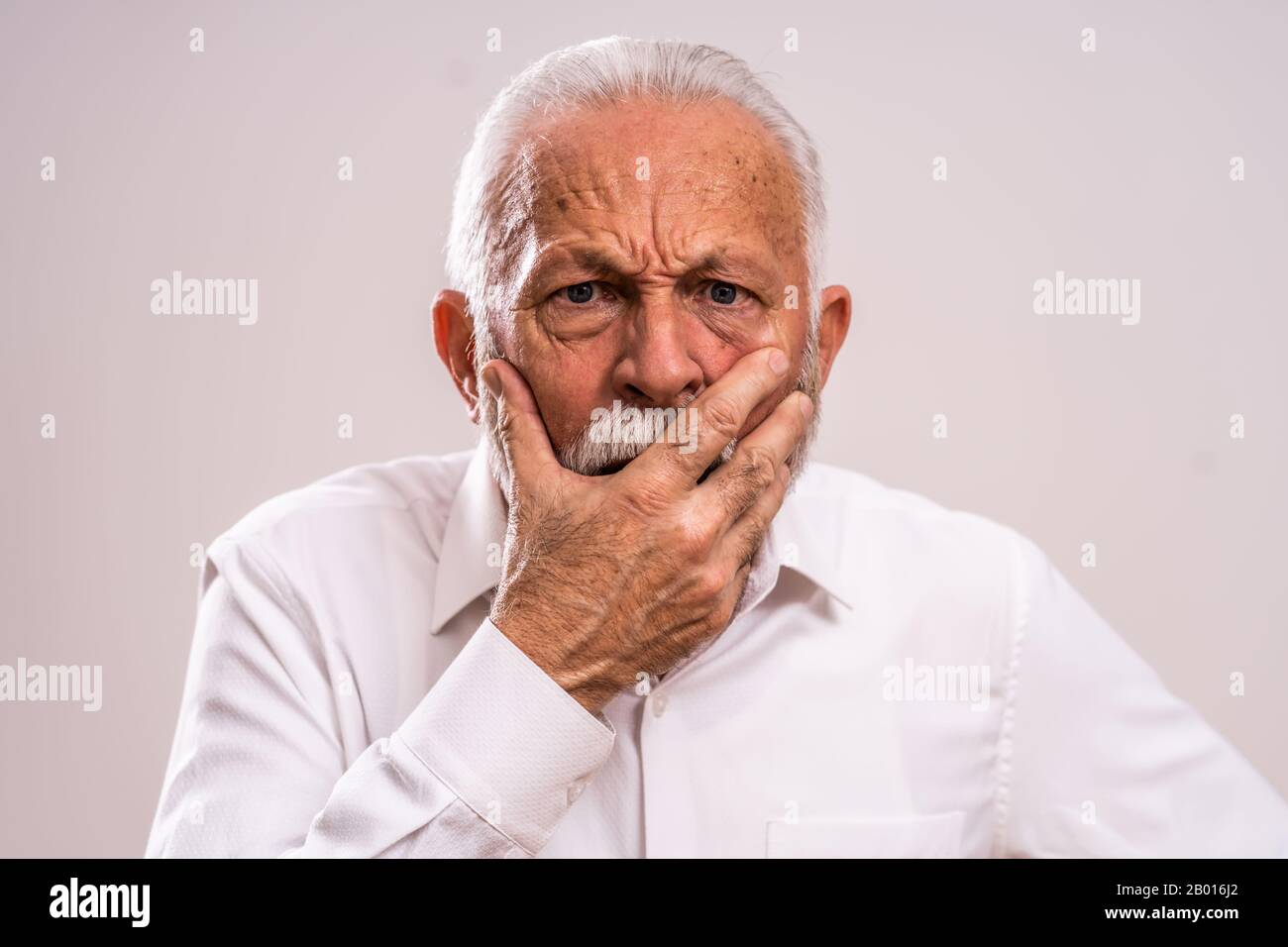 Portrait of surprised and shocked senior man Stock Photo - Alamy