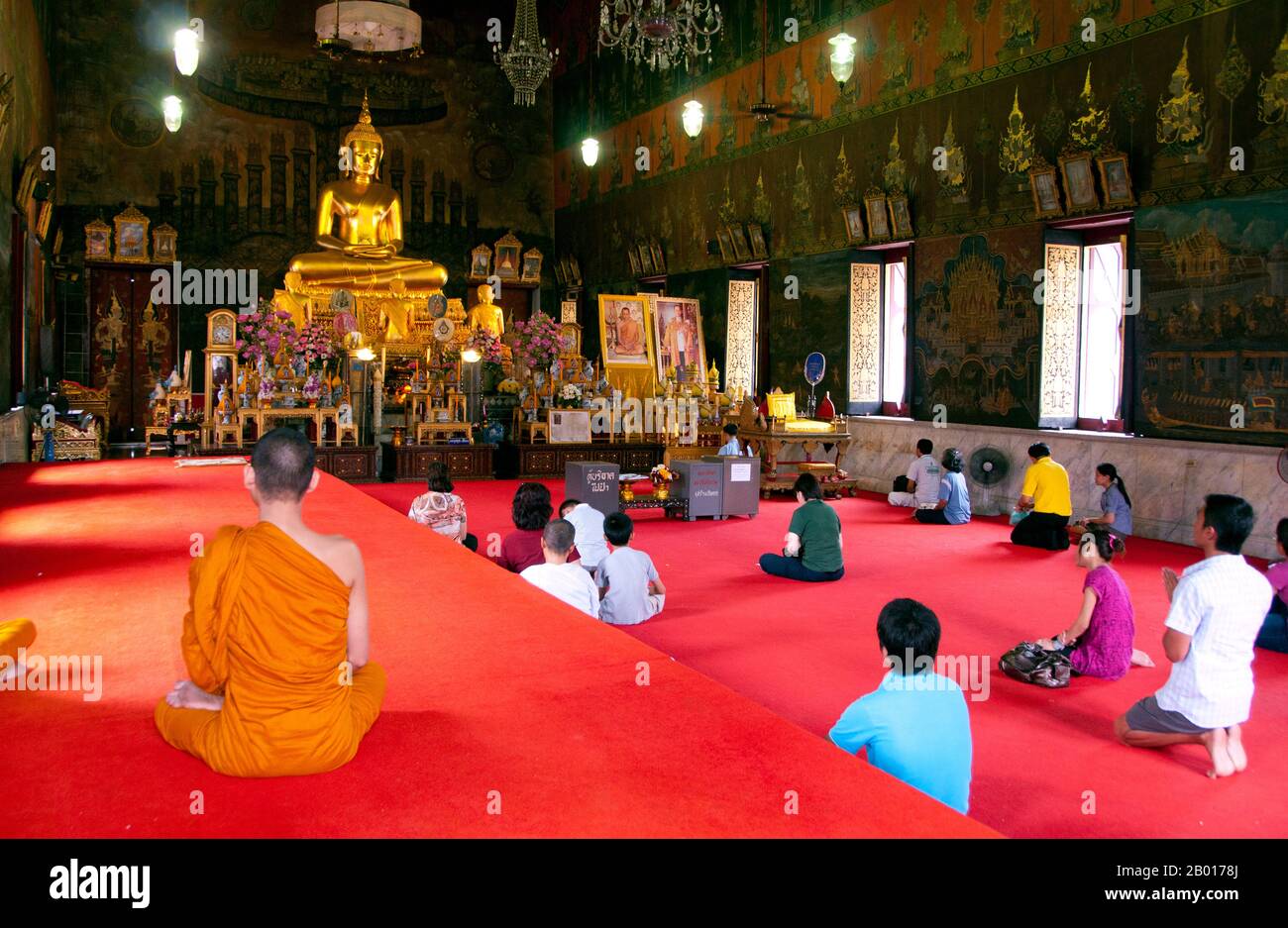Thailand: Devotees in the main viharn, Wat Rakhang, Bangkok. Wat ...