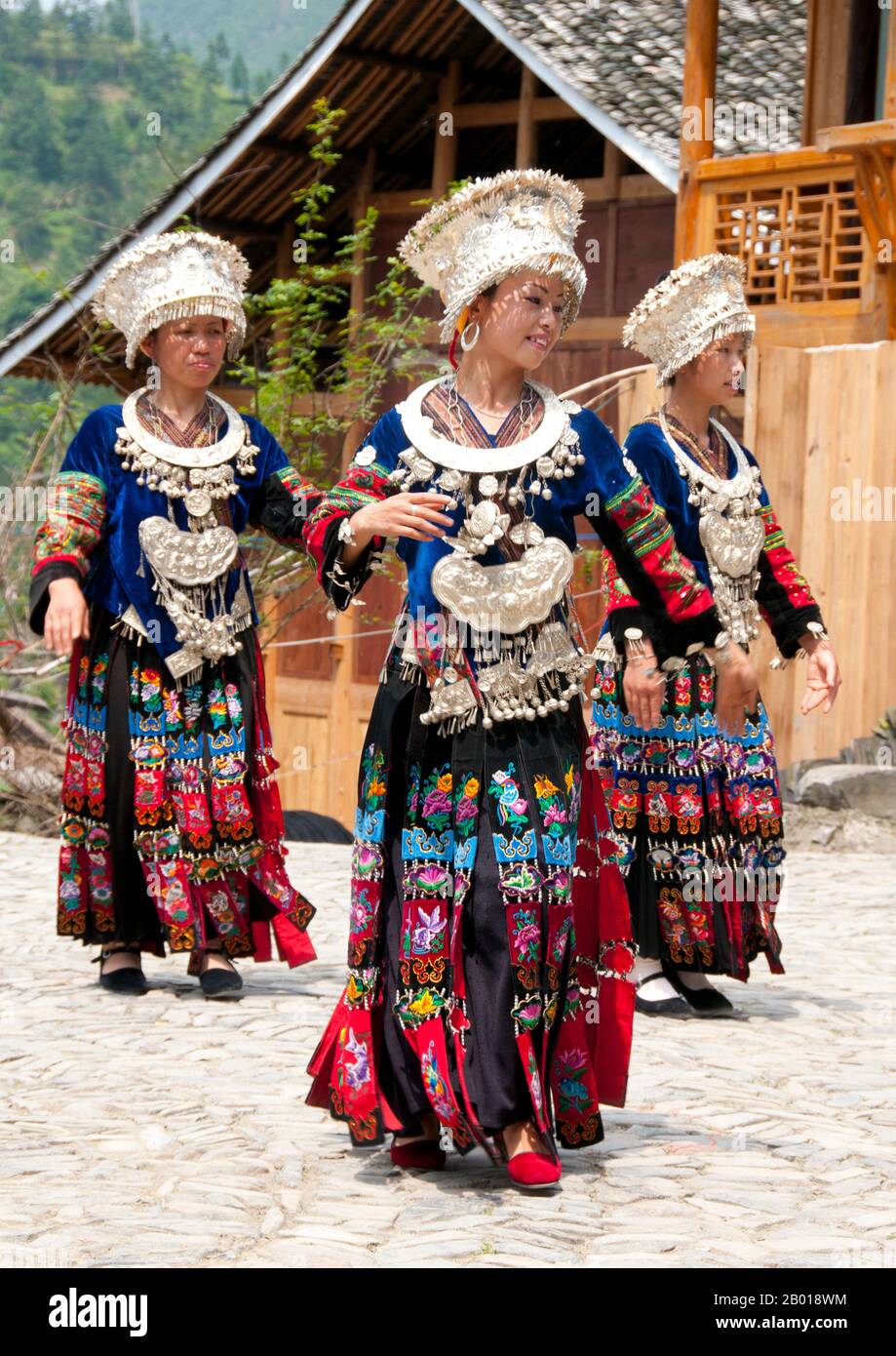 China: Miao women dancing in the village of Langde Shang, southeast of ...