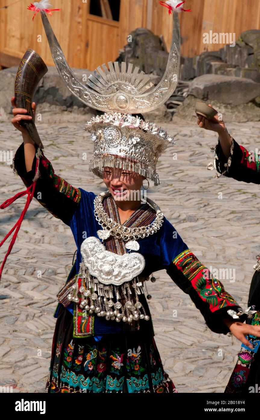 China: Miao woman dancing in the village of Langde Shang, southeast of ...