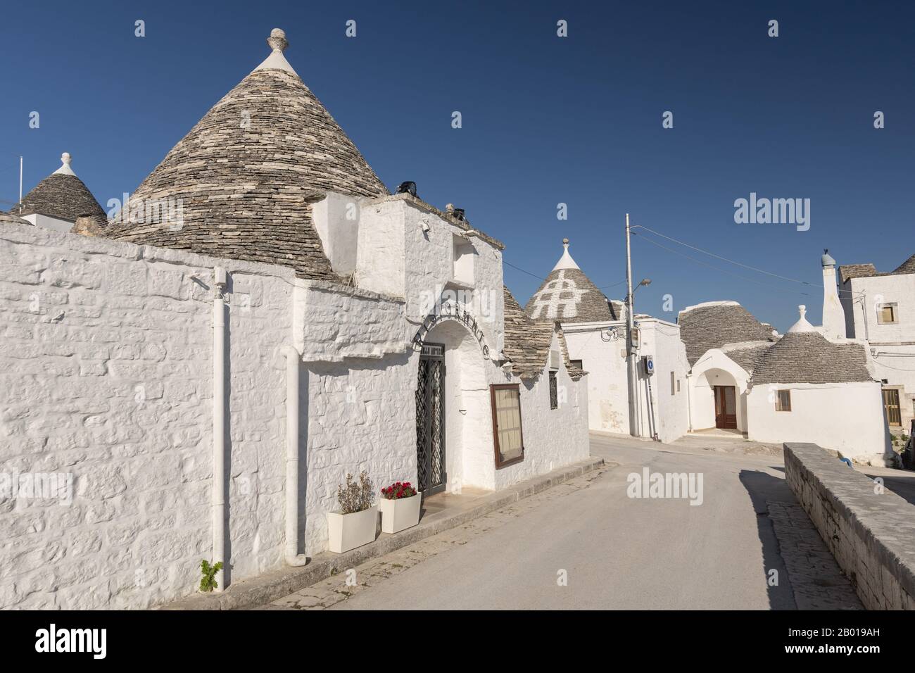 Unique Trulli houses, traditional Apulian dry stone hut with a conical ...