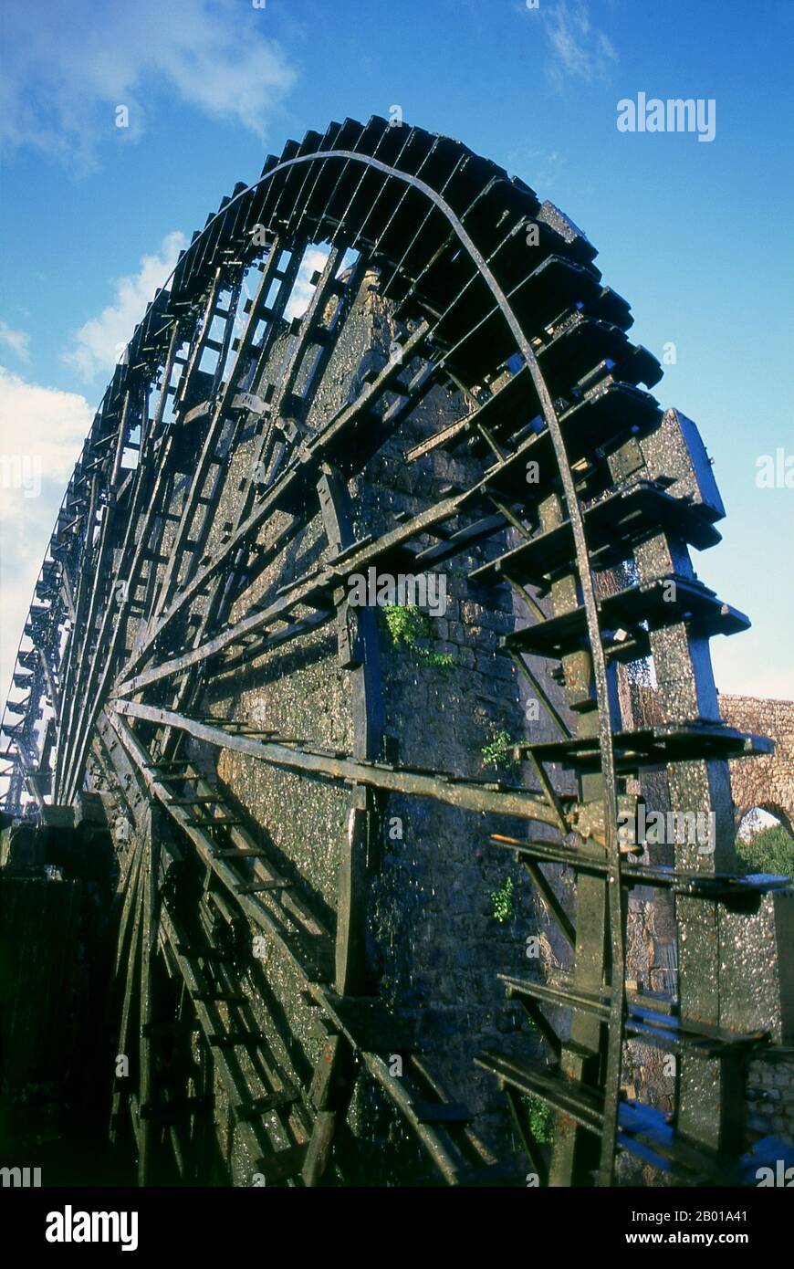 Syria: A 12th-13th century noria or giant waterwheel on the banks of ...