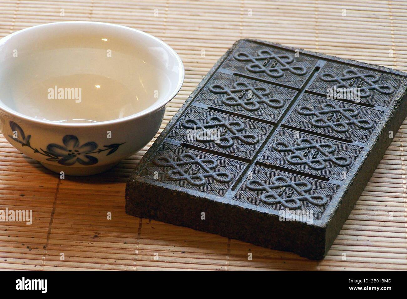 China: Compressed brick tea or 'zhuancha' from southern Yunnan, scored ...