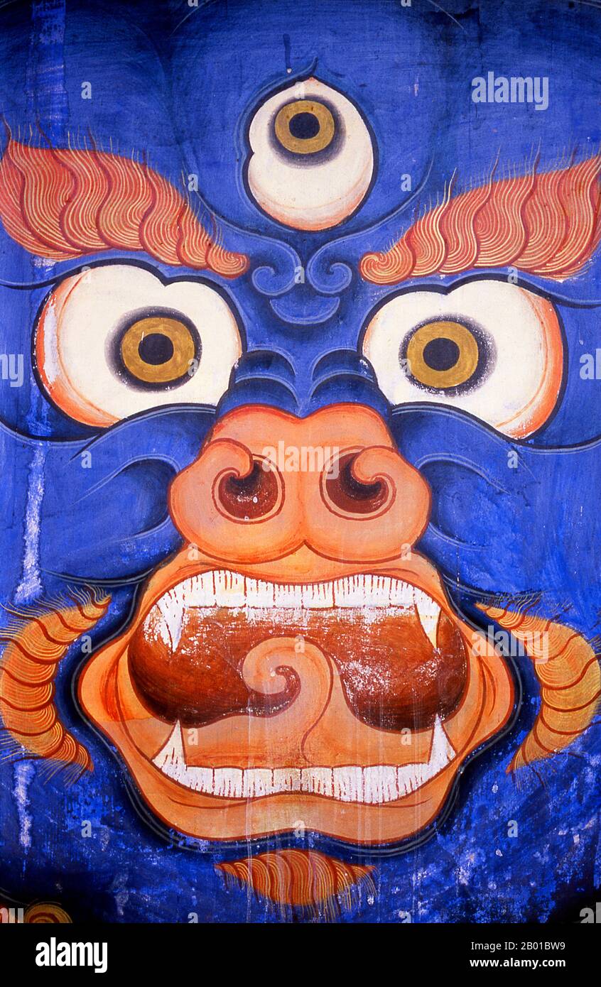China: Demon painted on a doorway at Labrang Monastery, Xiahe, Gansu ...