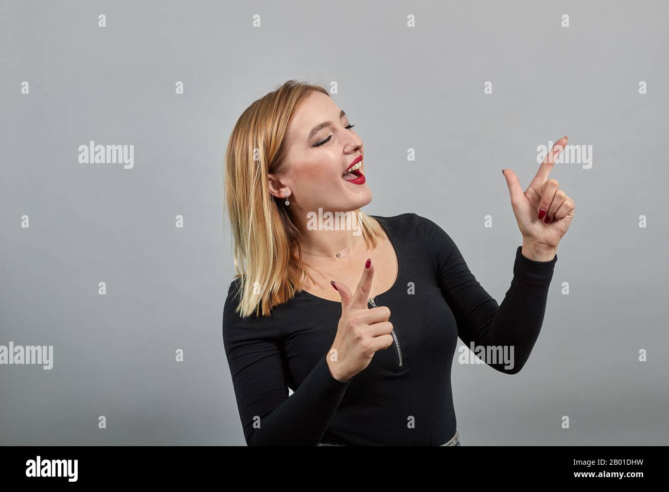 happy woman dancing moving her hands Stock Photo - Alamy