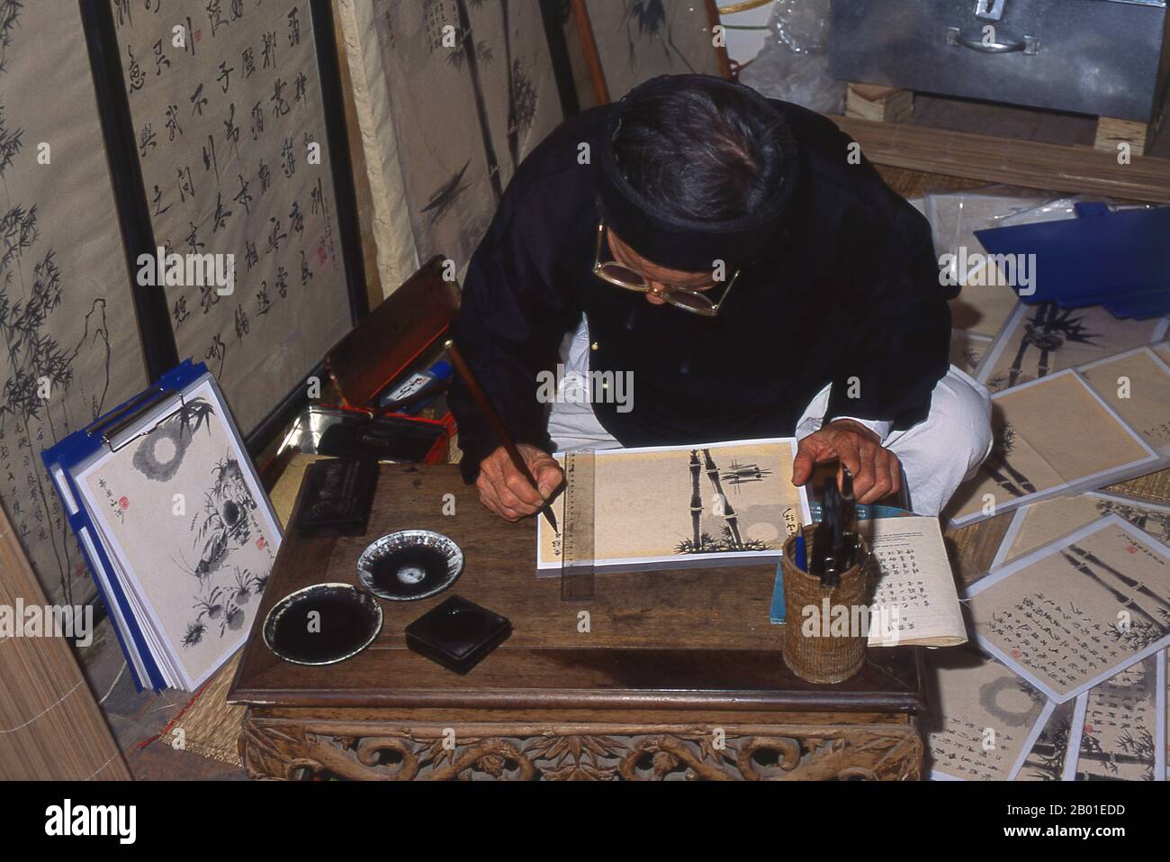 Vietnam: Calligraphy artist at Memorial House in Hanoi's Old Quarter ...