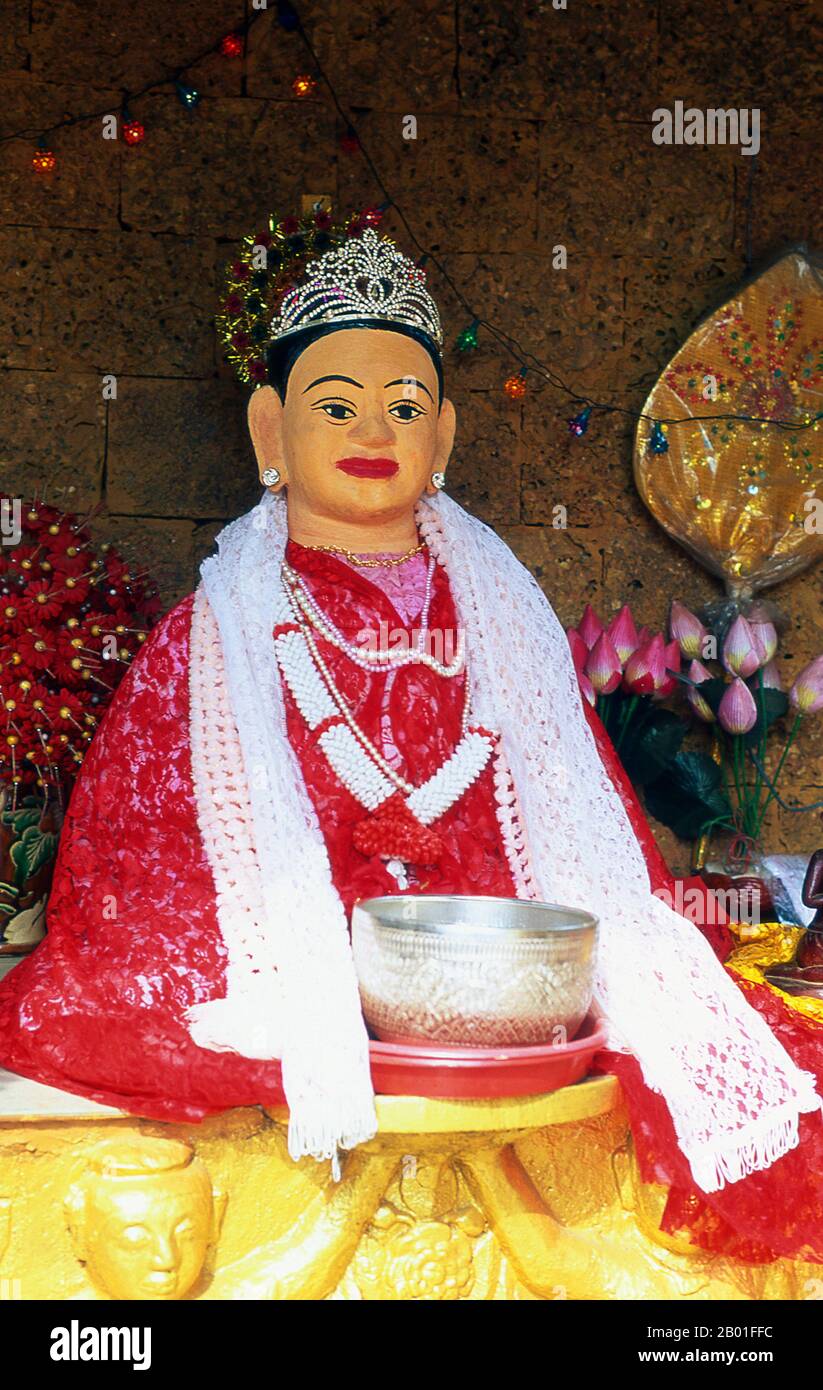 Cambodia: A statue of Penh, the founder of Phnom Penh, Wat Phnom, Phnom ...