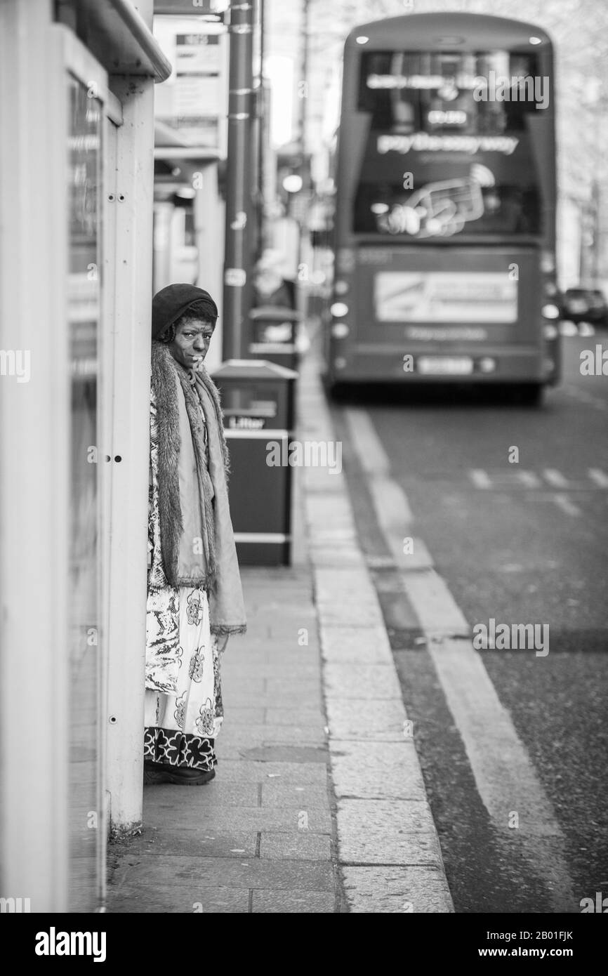 Old lady waiting for bus hi-res stock photography and images - Alamy