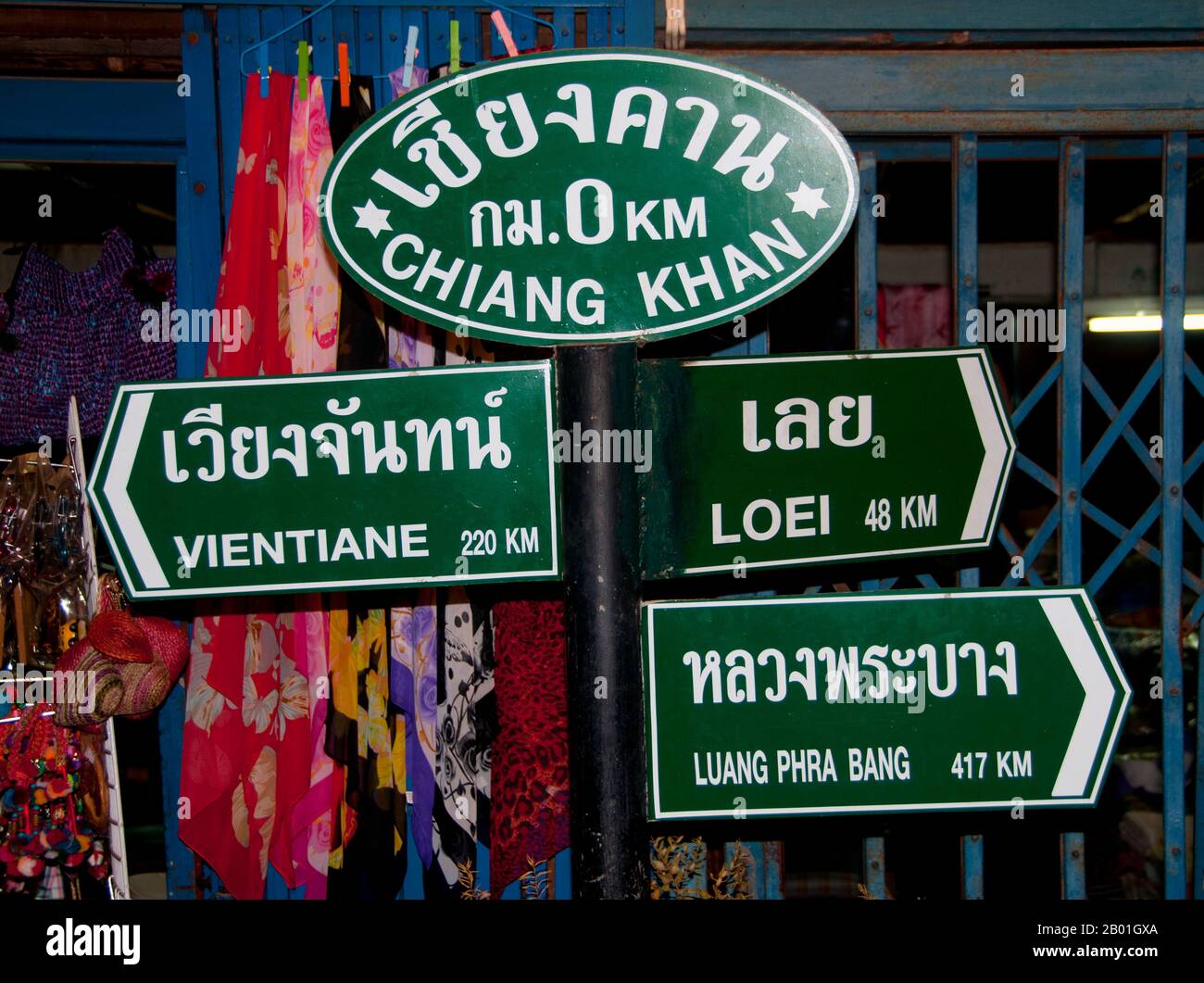 Thailand: Signposts to destinations in Thailand and Laos outside a shop ...