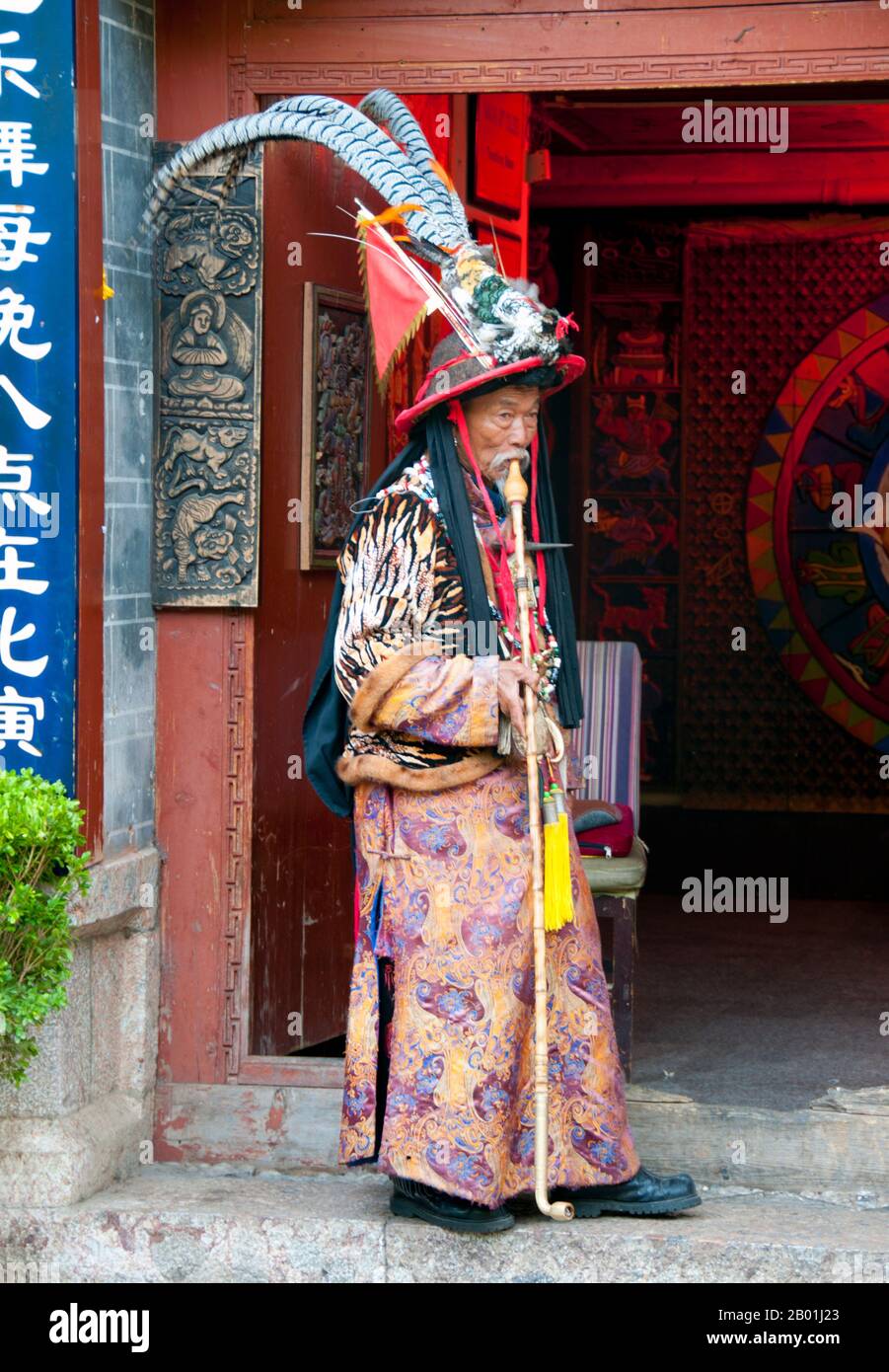 China: A Naxi dongba (shaman), Lijiang Old Town, Yunnan Province. The ...