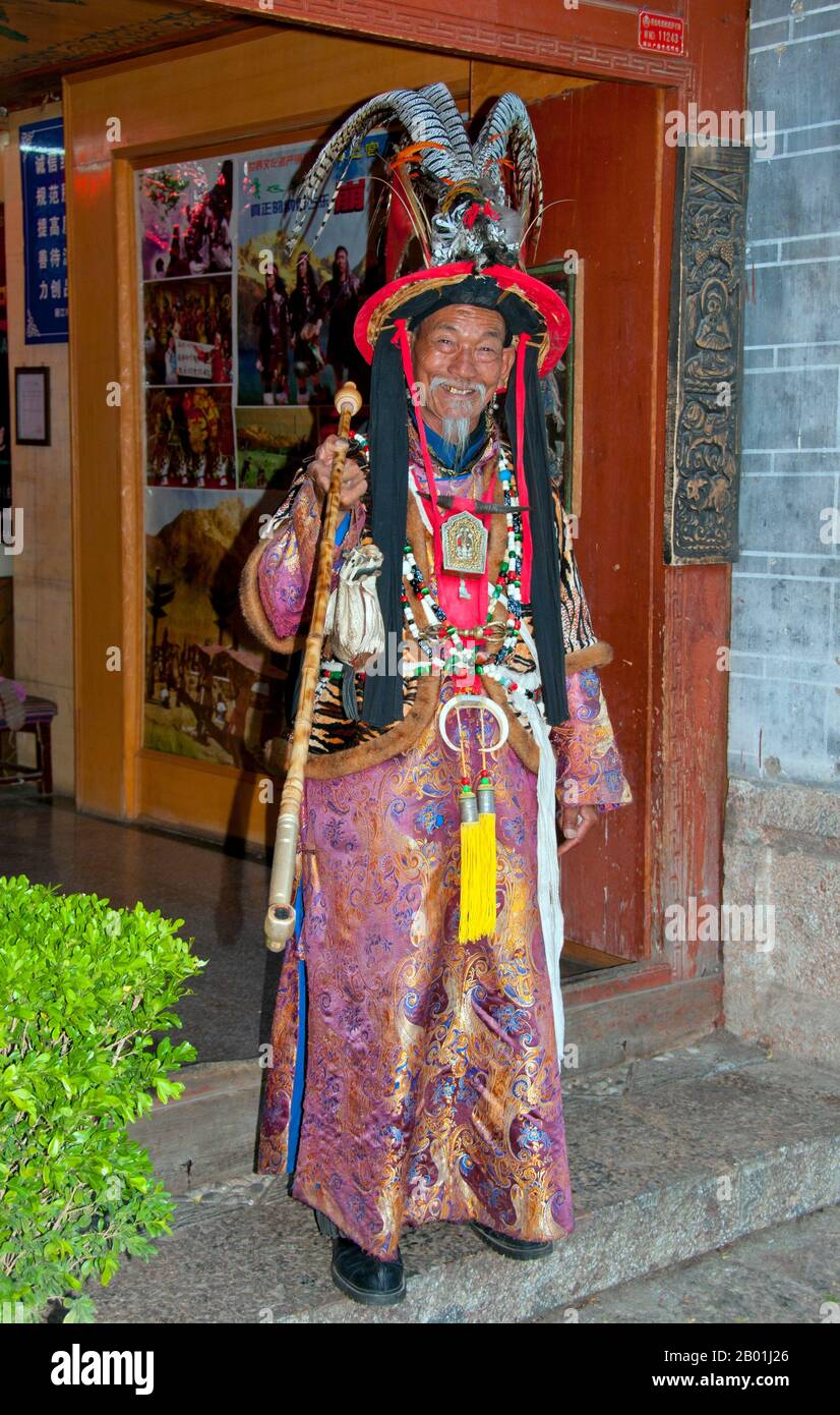 China: A Naxi dongba (shaman), Lijiang Old Town, Yunnan Province. The ...