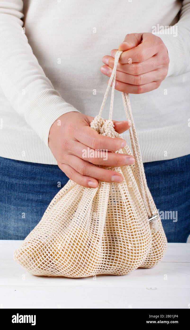 Put in bag hi-res stock photography and images - Alamy
