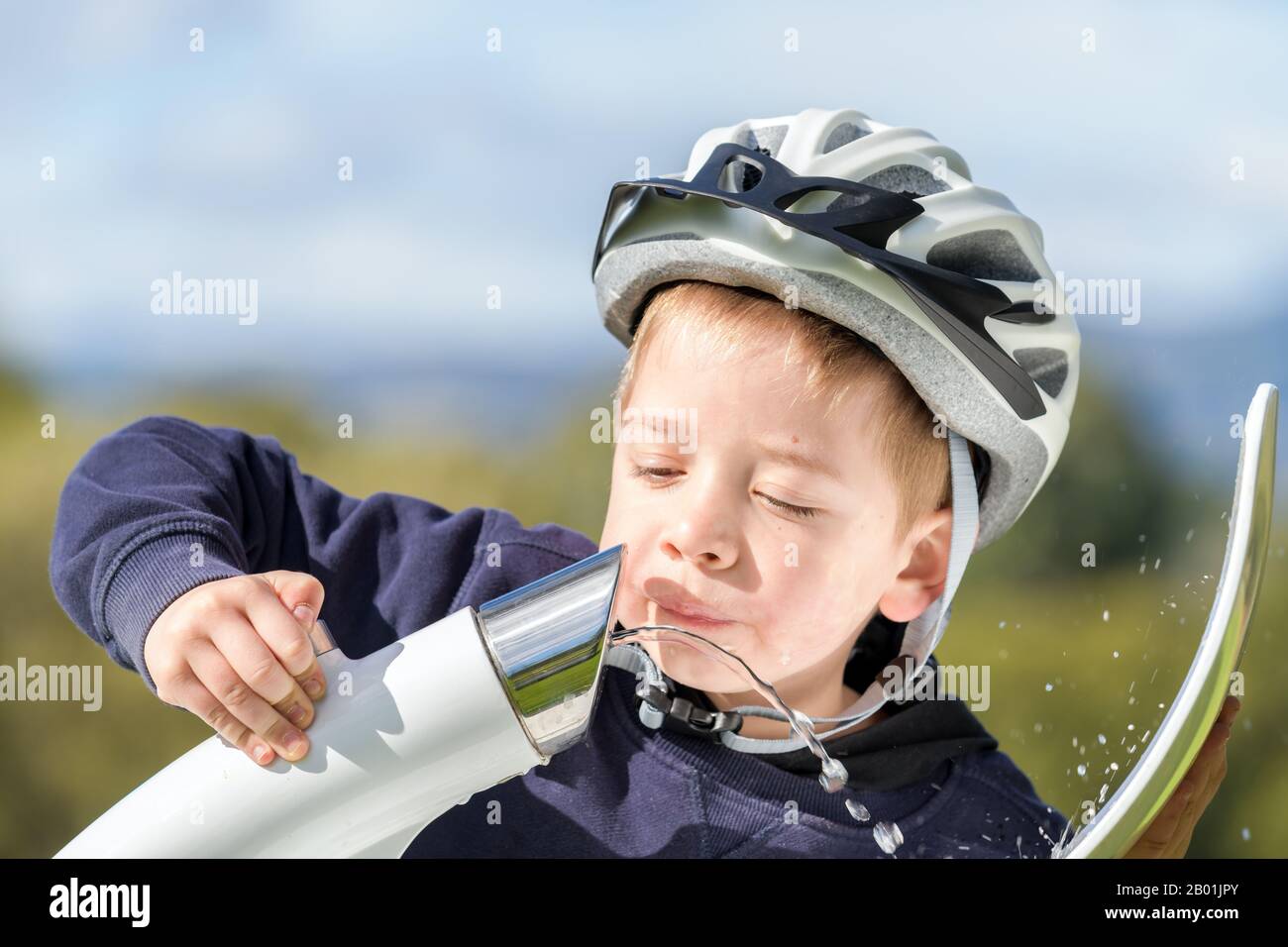 Child drinking water tap hi-res stock photography and images - Alamy