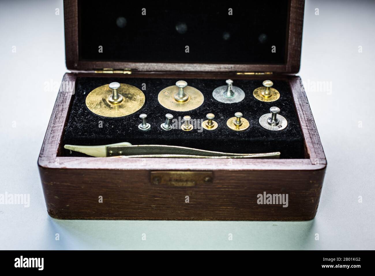 gold-colored brass weight set Stock Photo - Alamy