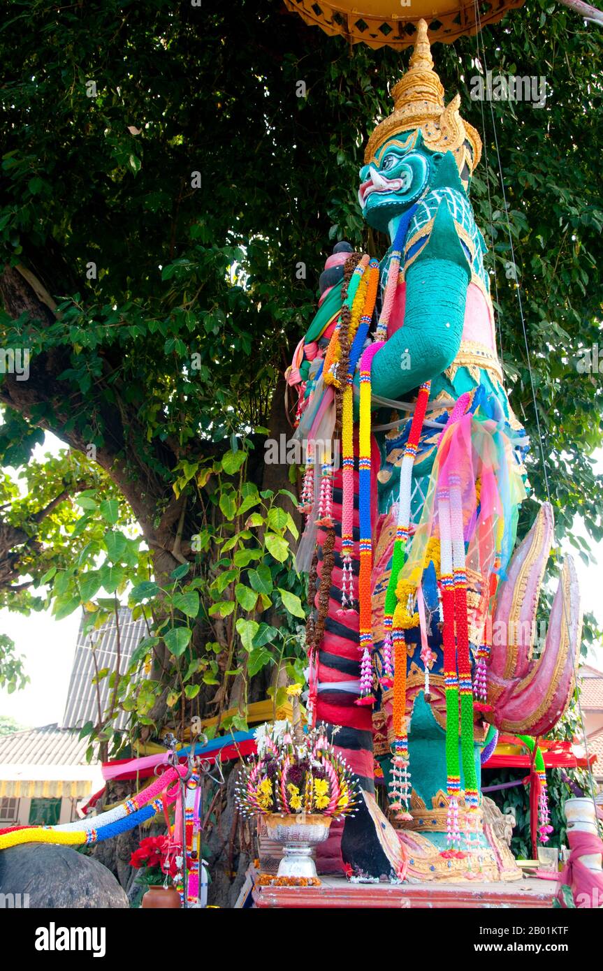 Thailand: A yaksa guards a bo tree shrine, Wat Si Lom, Lampang, Lampang ...