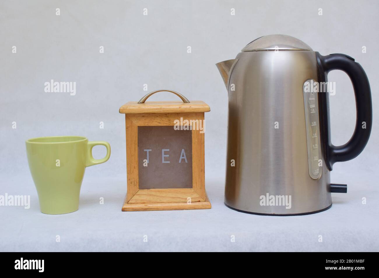 Mockup / design set of colorful Tea or coffee ceramic mug beside wooden ...