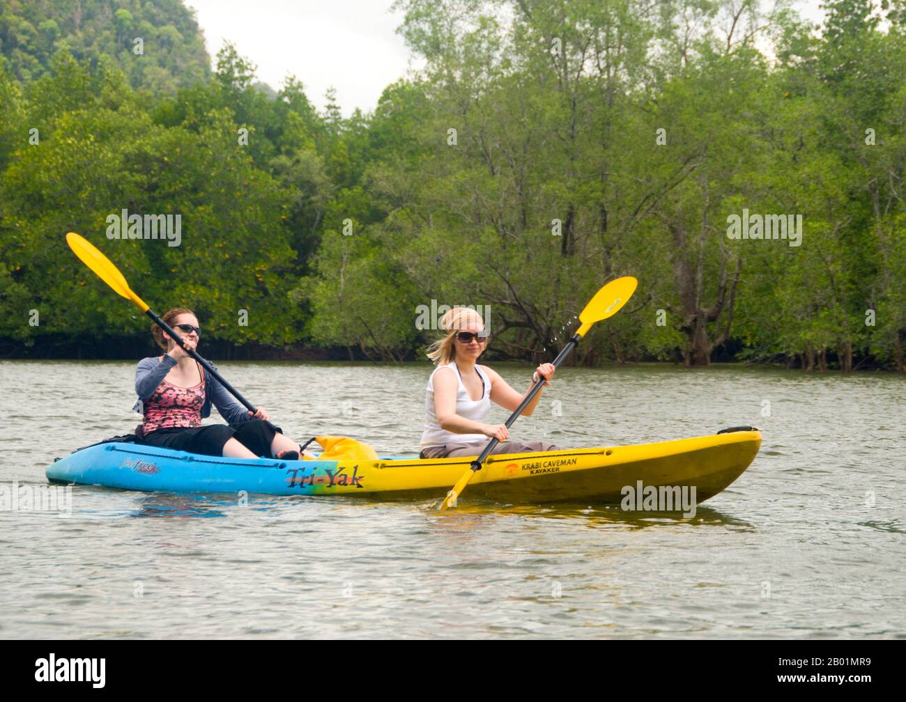 Thailand: Visitors kayaking to the Tham Phi Hua To cave (also known as ...