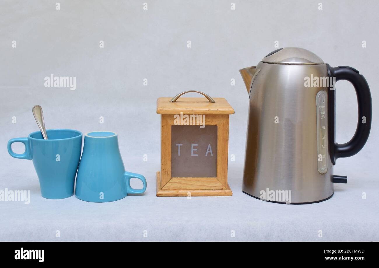 Mockup / design set of colorful Tea or coffee ceramic mug beside wooden ...