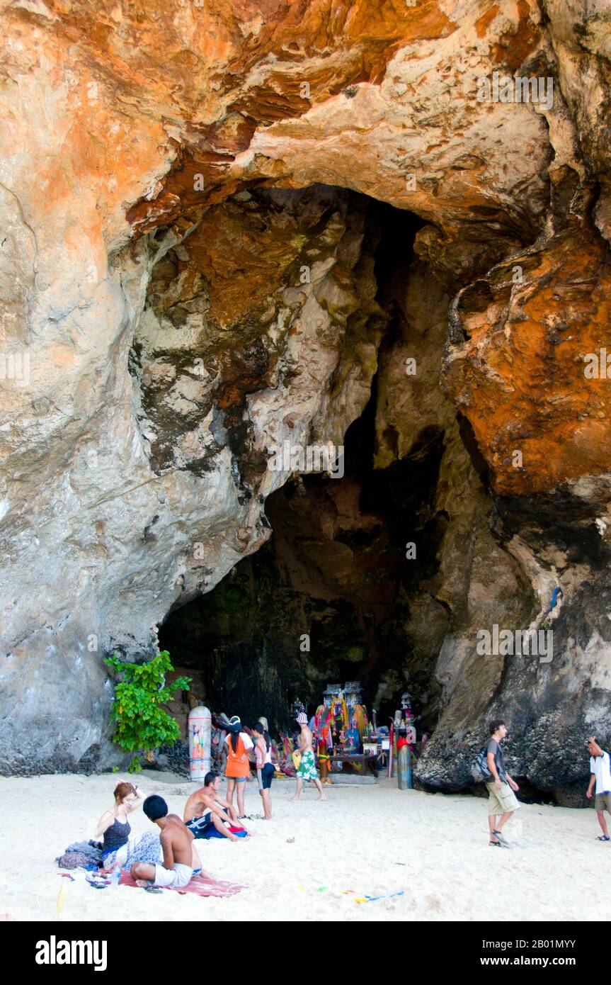 Thailand: Enjoying the shade of the cliff next to the Phra Nang cave ...