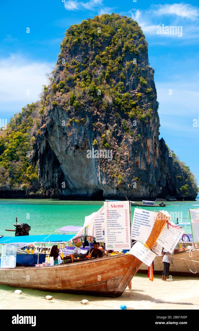Thailand: Tour boats and food boats lined up on the beach at Hat Tham ...