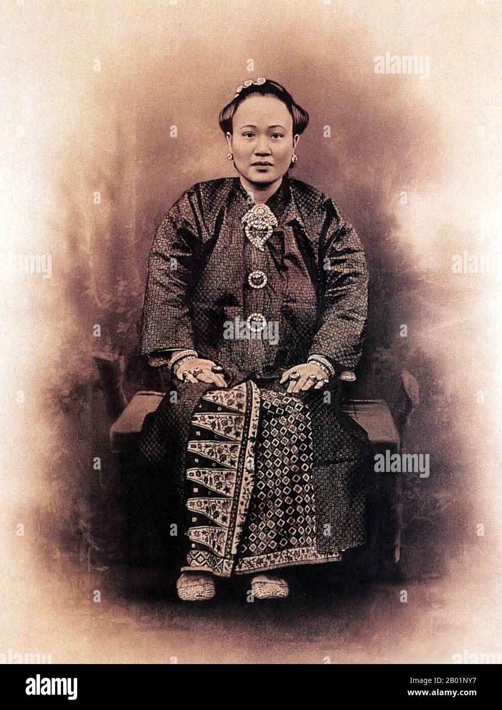 Malaysia/Singapore: A Nyonya lady in formal attire, early 20th century ...