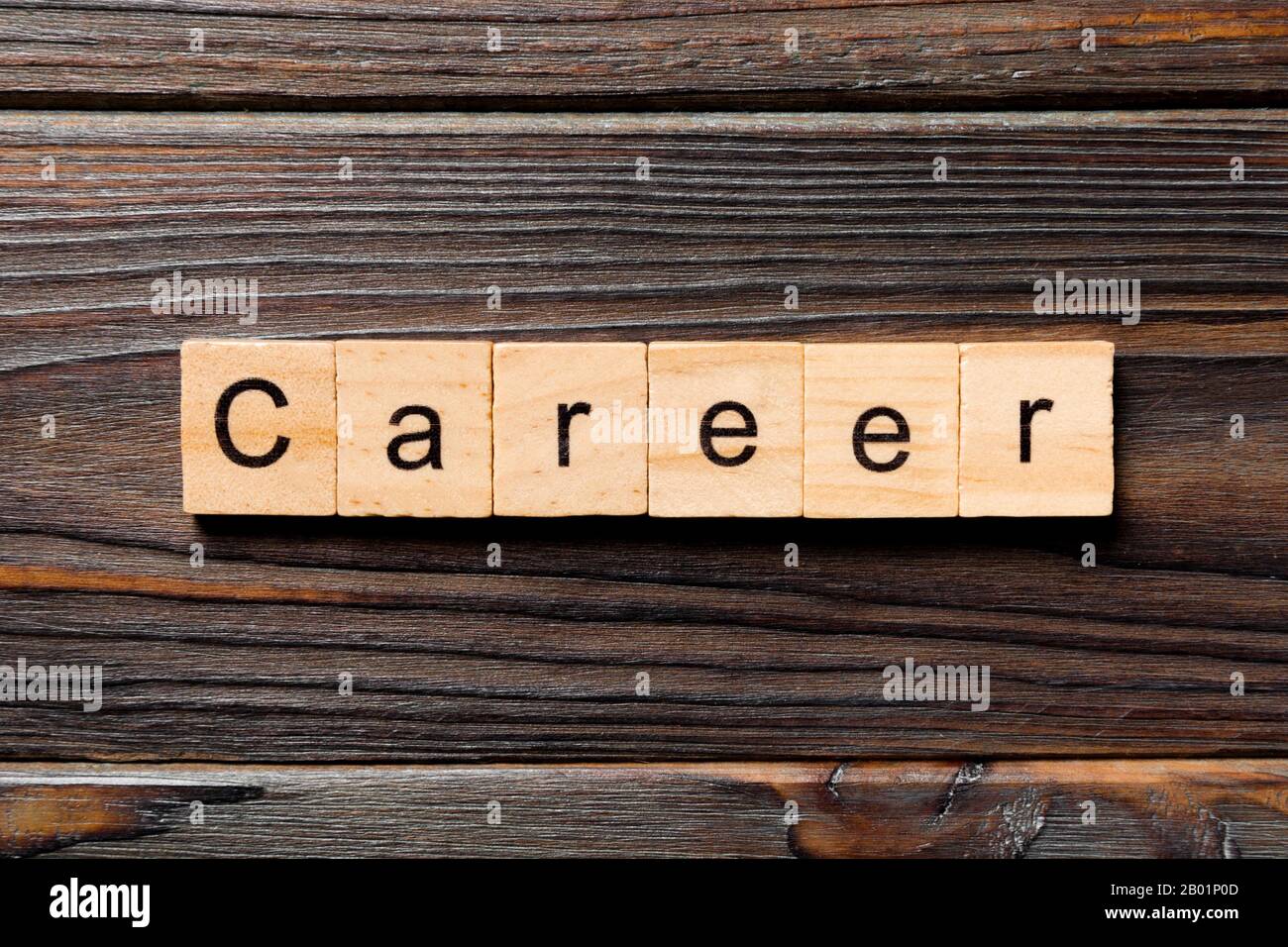 Career word written on wood block. Career text on wooden table for your ...