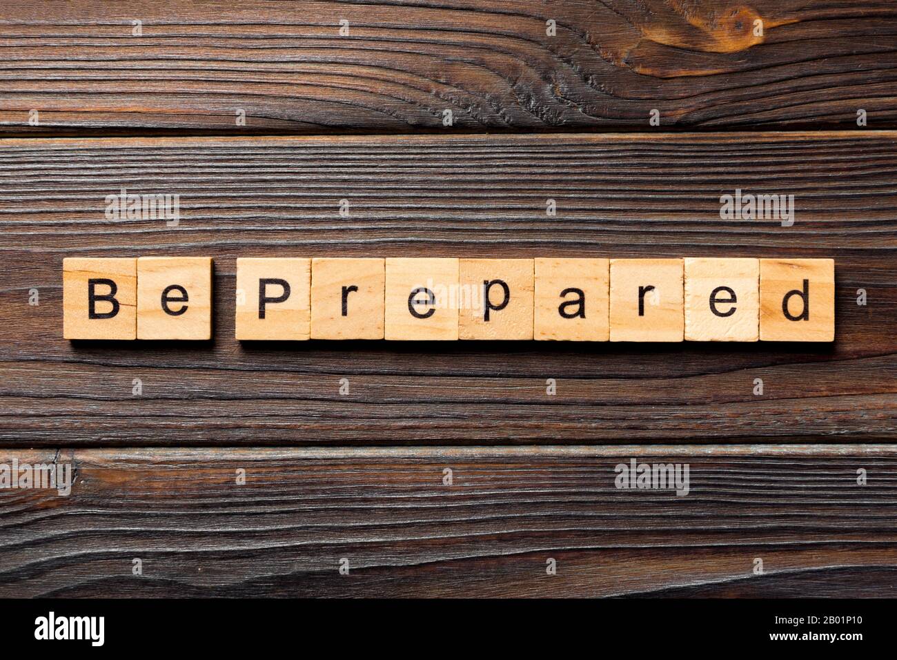 BE PREPARED word written on wood block. BE PREPARED text on wooden ...