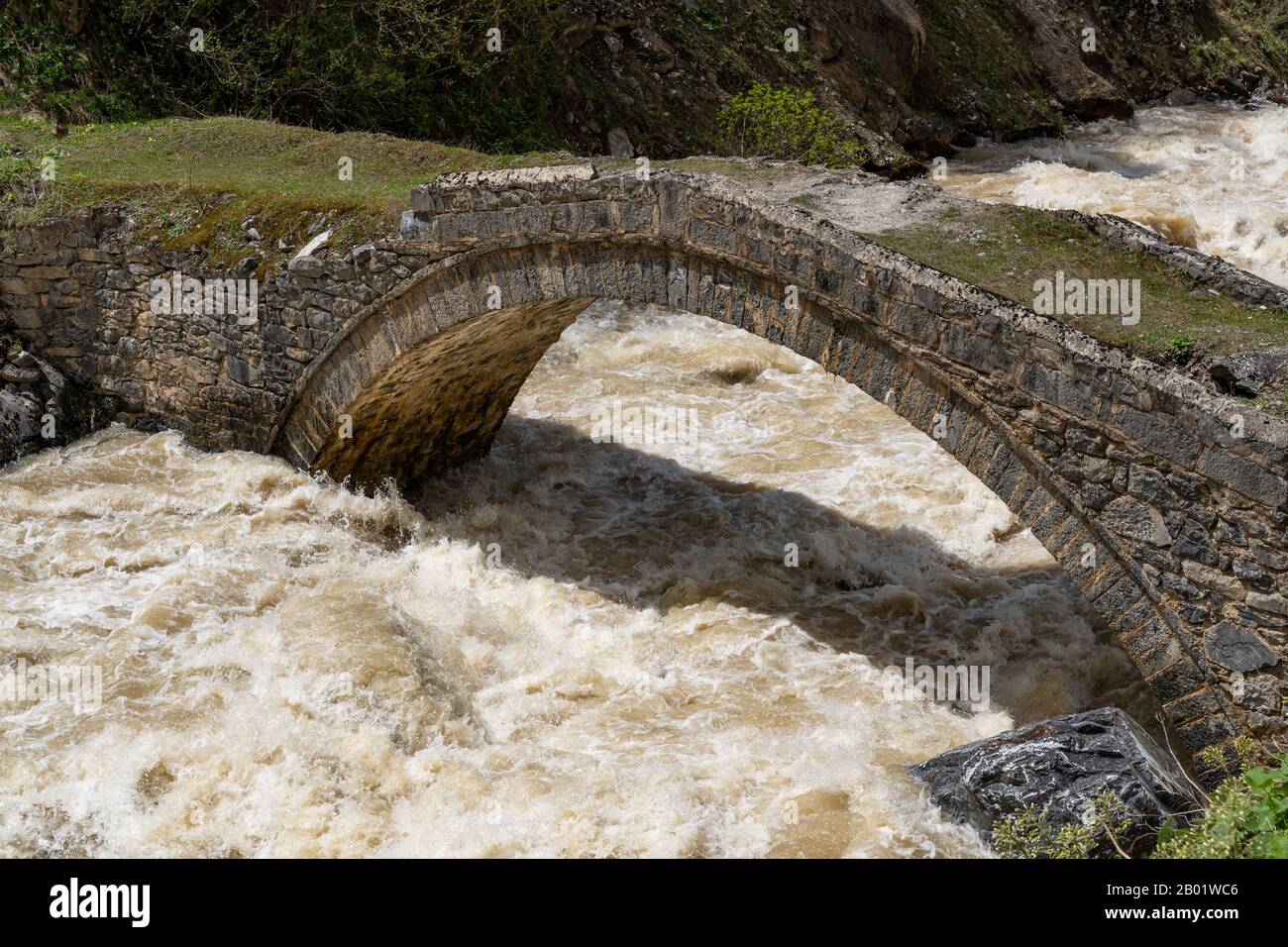 Old Turkish arch bridge at Arakli in the Pontic Mountains in Turkey ...