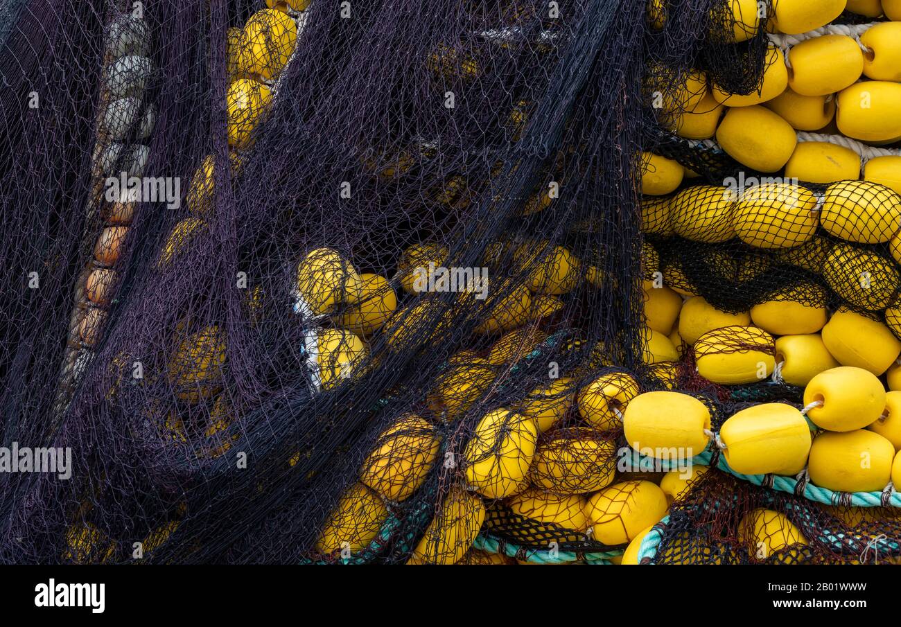 Colorful fishing net with yellow buoys in the Turkish town of Sinop ...