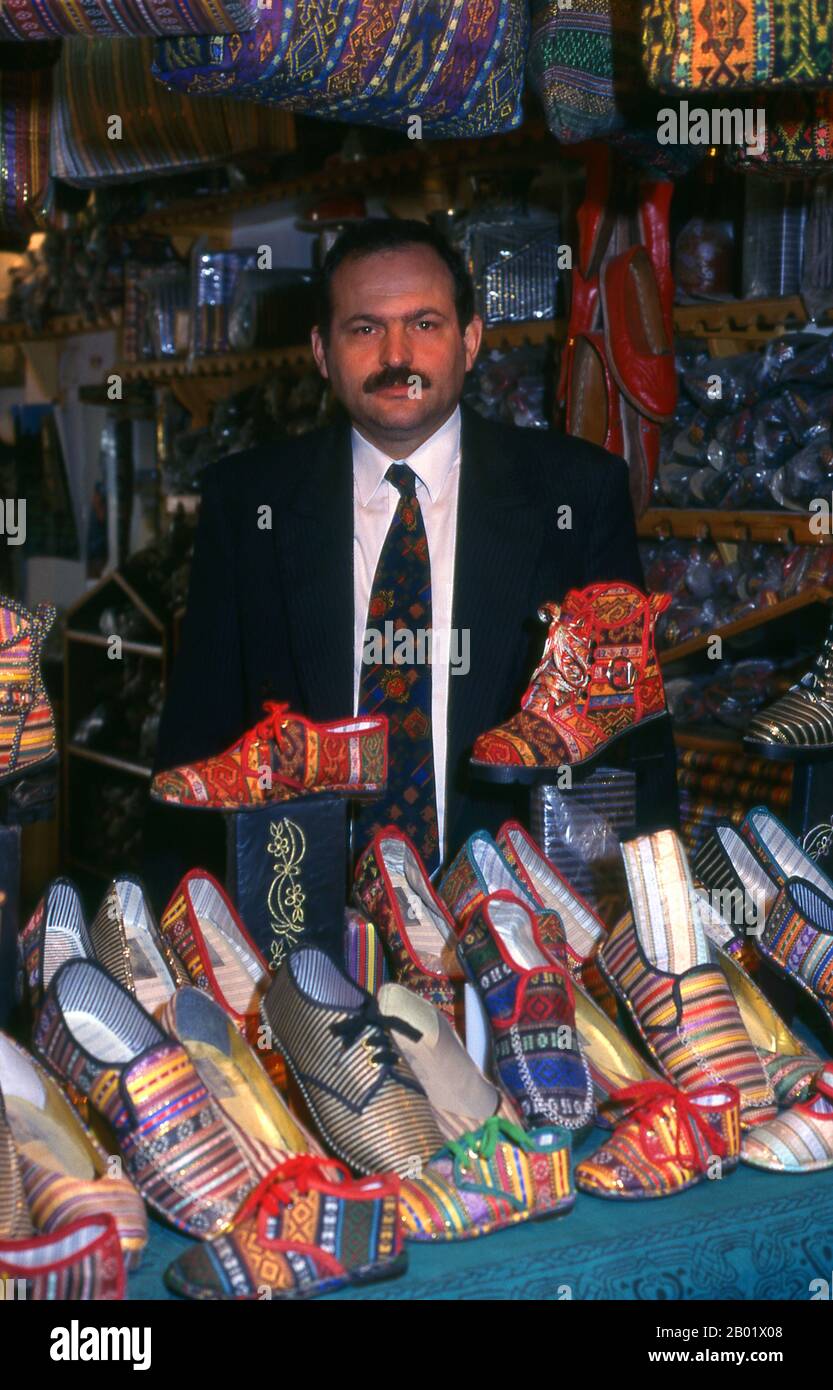 Syria: A shoe shop owner in the restored handicraft suq within Aleppo's ...