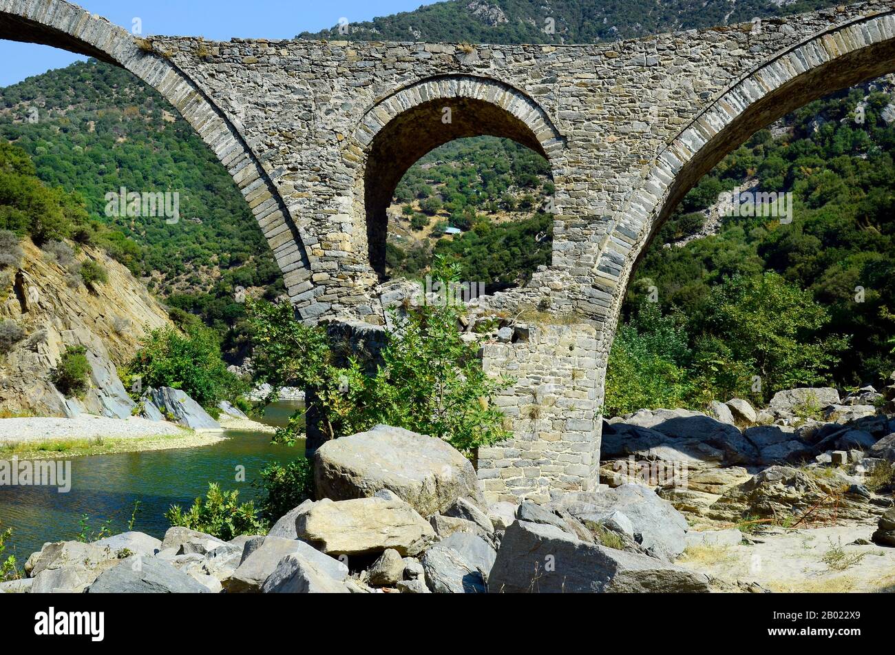 Greece, detail of ancient byzantine arch bridge over river Kompsatos ...