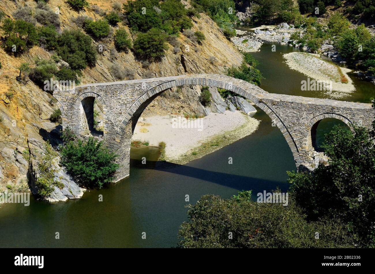 Greece, ancient byzantine arch bridge over river Kompsatos Stock Photo ...