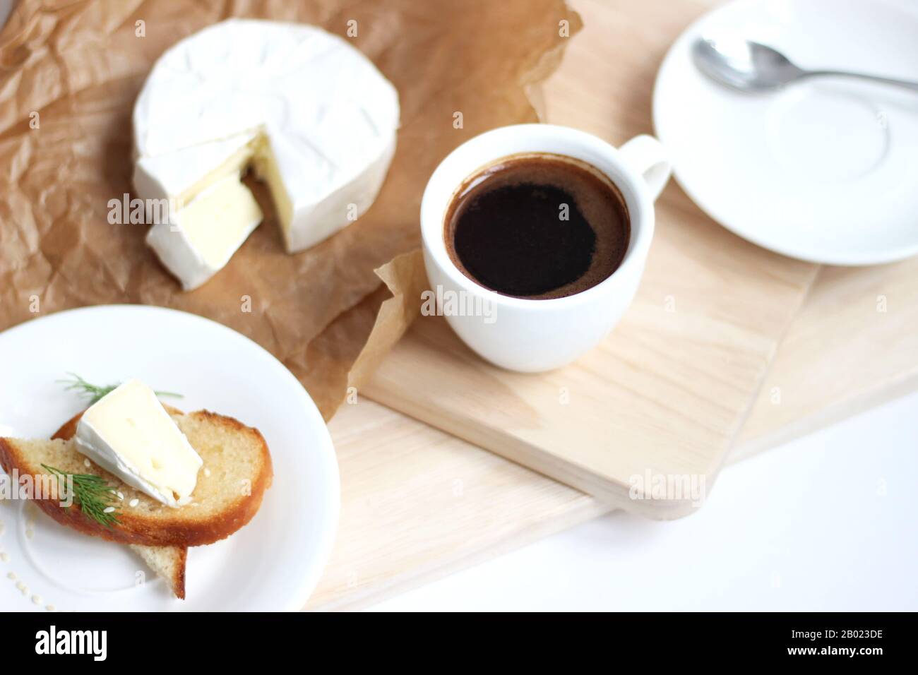 French Cheese Camembert on a Fresh Bread Toast with a Cup of freshly ...