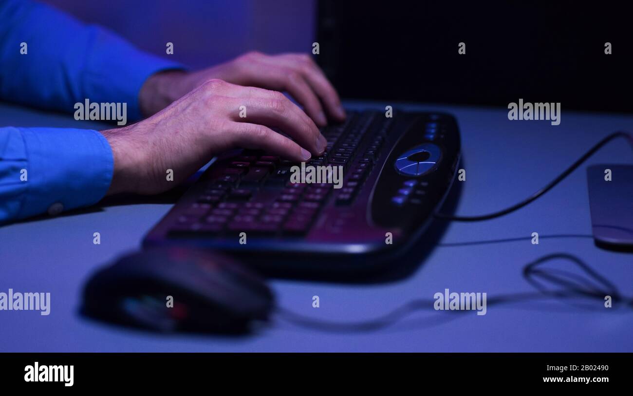 Male Hands On Computer Keyboard, Programmer Coding Indoor At Night ...