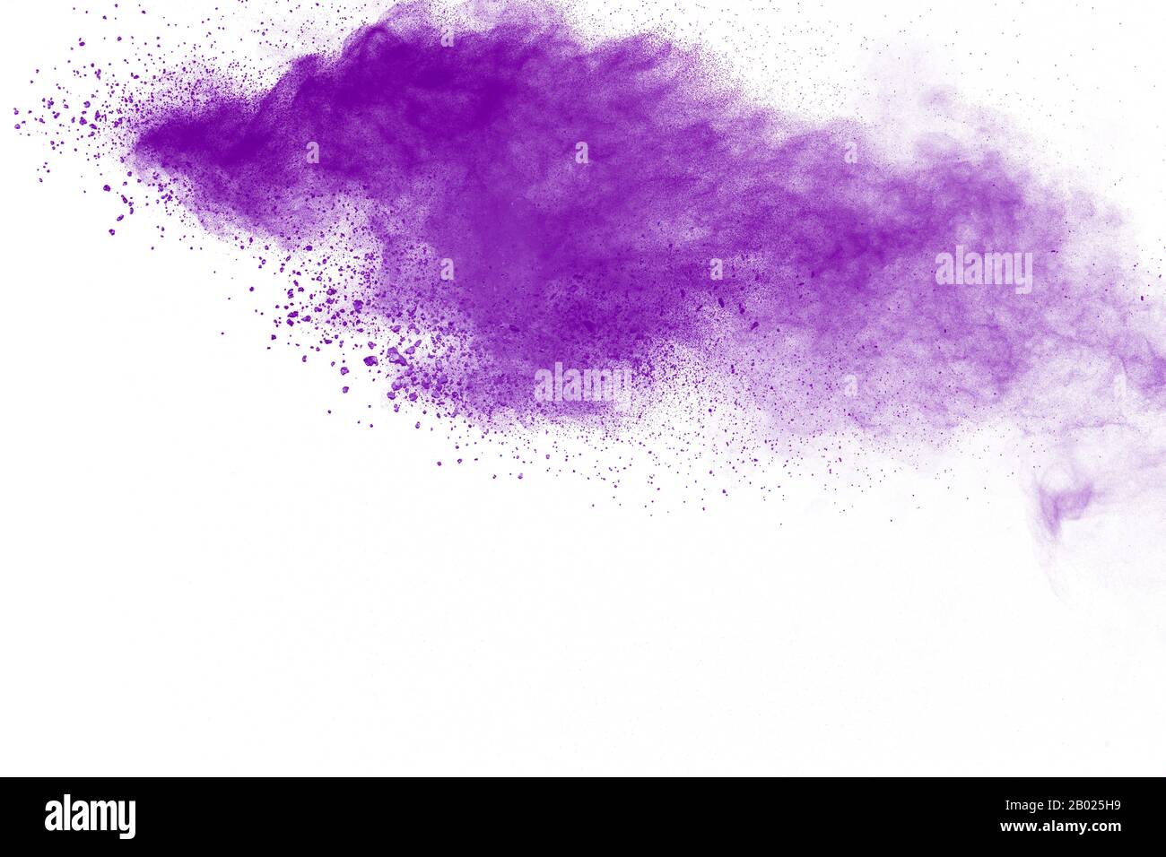 Purple particles explosion on white background. Freeze motion of purple ...