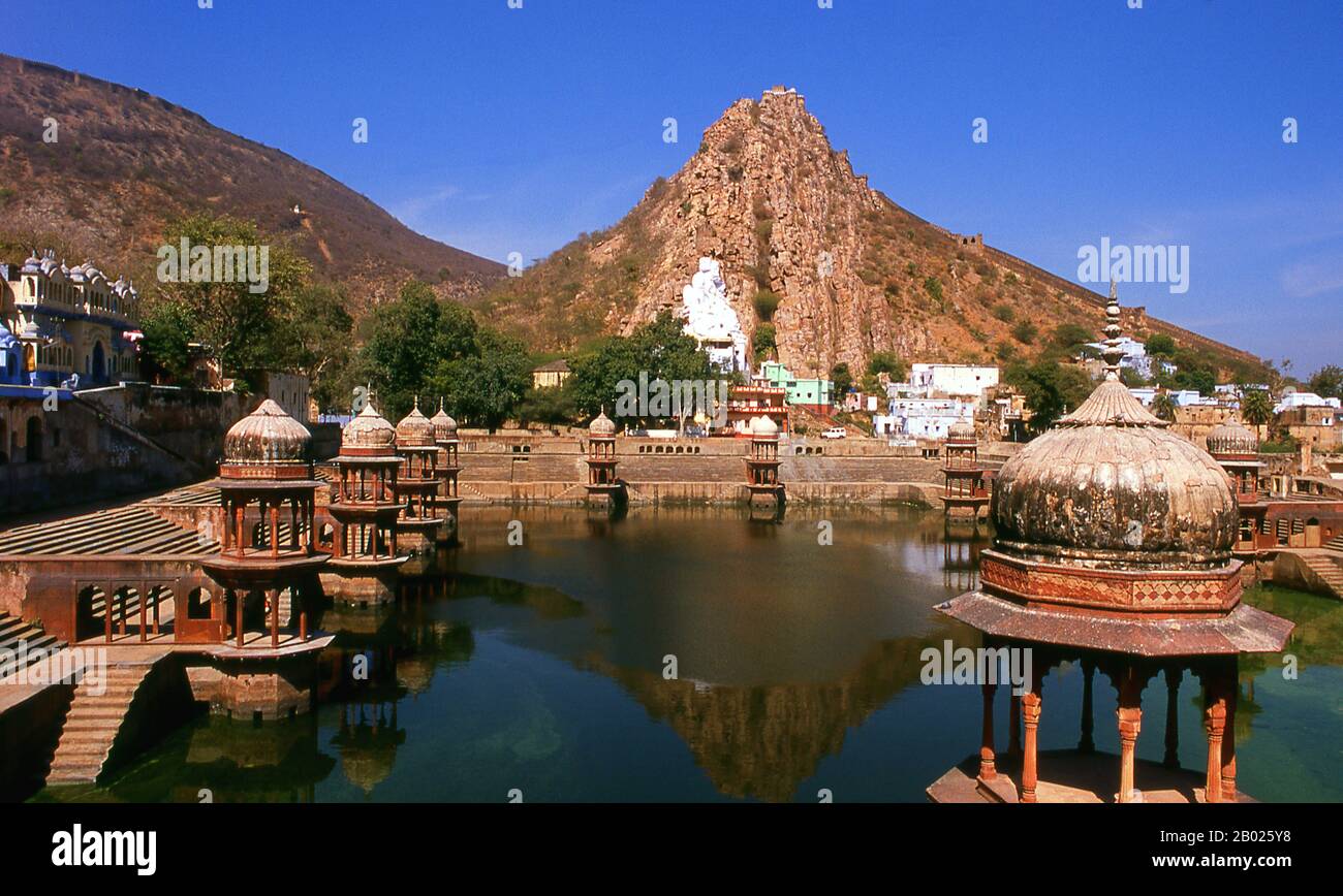 India: The Bala Qila (Alwar Fort) looms above the huge kund (tank) next ...