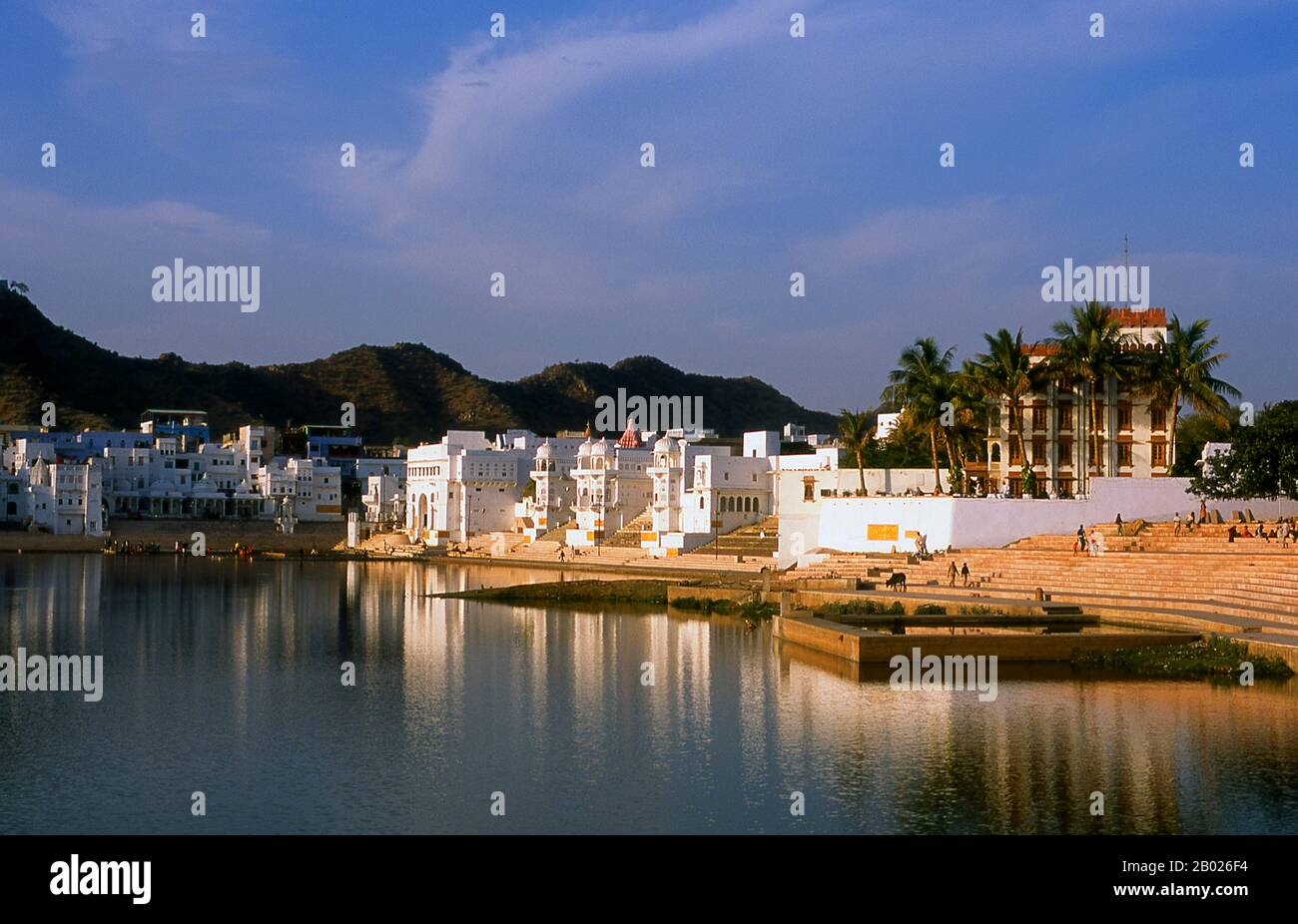 India: Ghats (holy stairs) surround Pushkar’s holy lake, Rajasthan. Pushkar is one of India's ...
